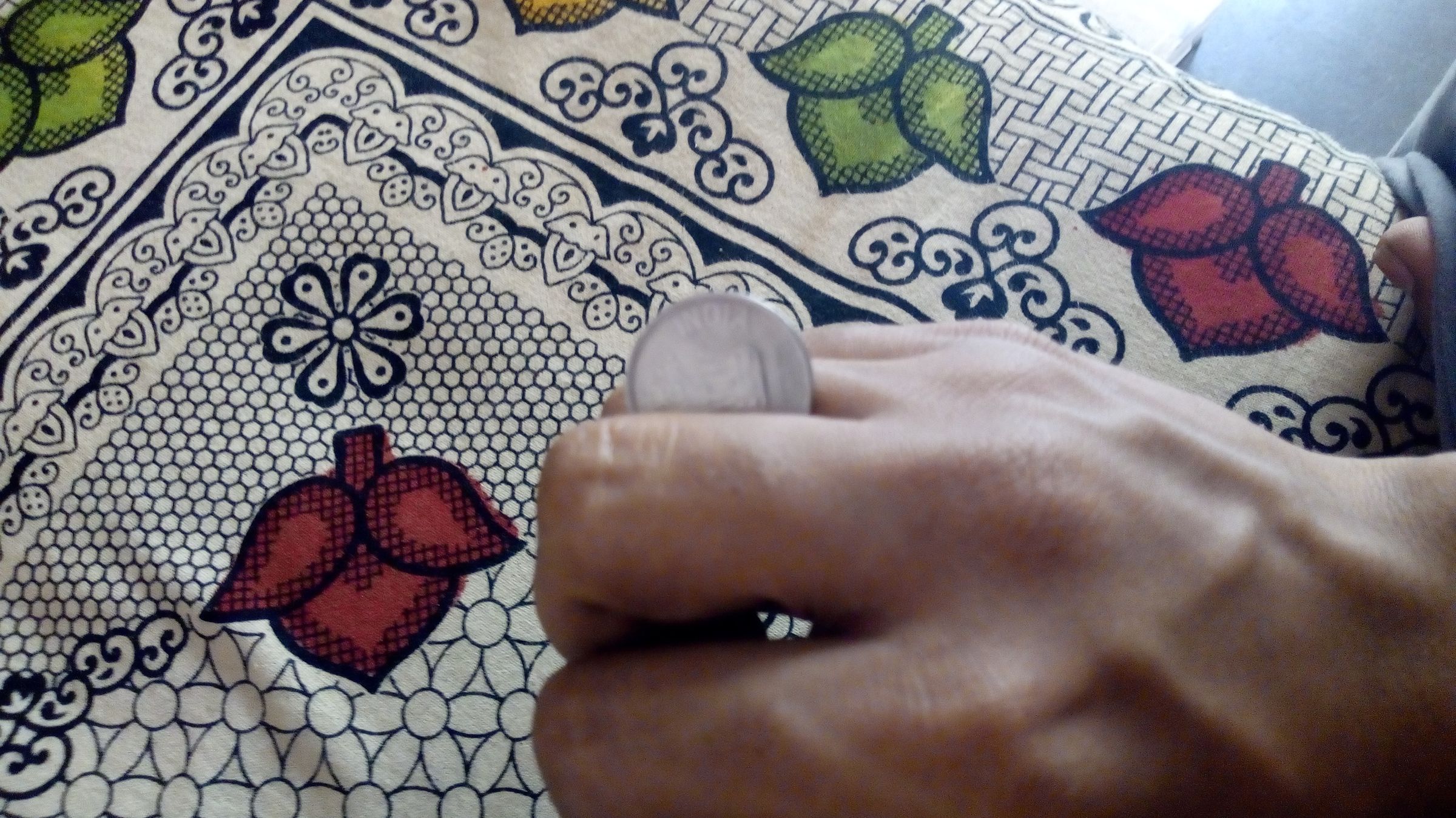 Rolling Coin Across Your Fingers! Coin Trick : 5 Steps - Instructables