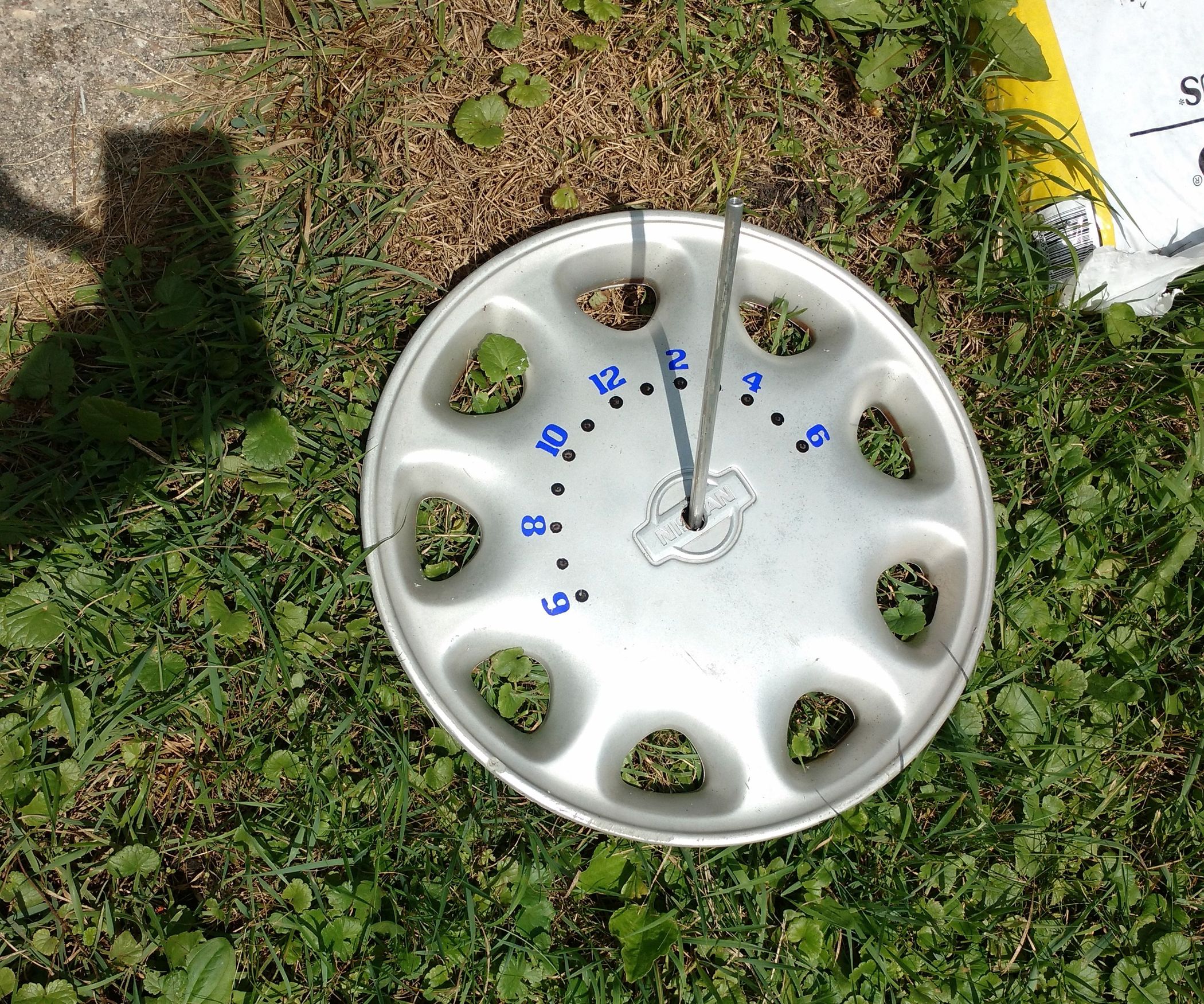 Solar Sundial Clock From Hubcap : 5 Steps - Instructables