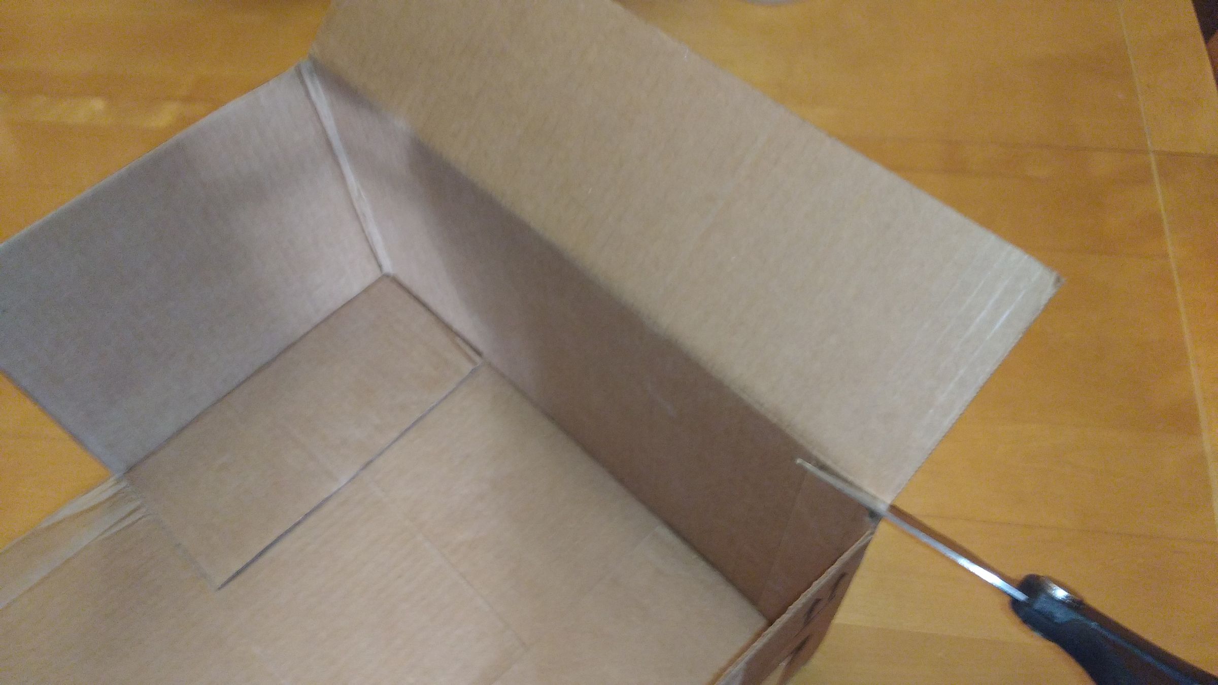 Make a Free/Inexpensive Fishing Rod Wrapping Jig Out of a Cardboard Box ...
