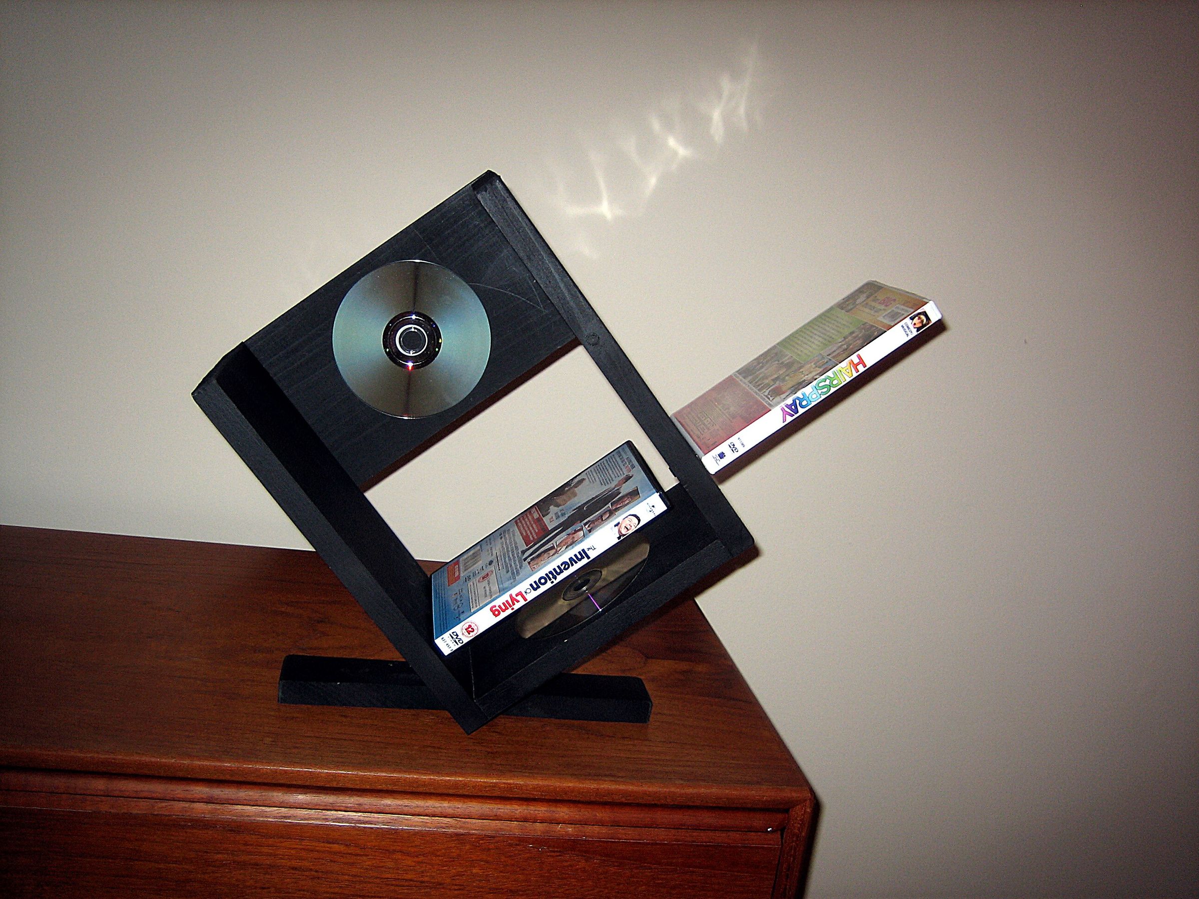 Simple Anti-Gravity DVD Holder : 5 Steps - Instructables