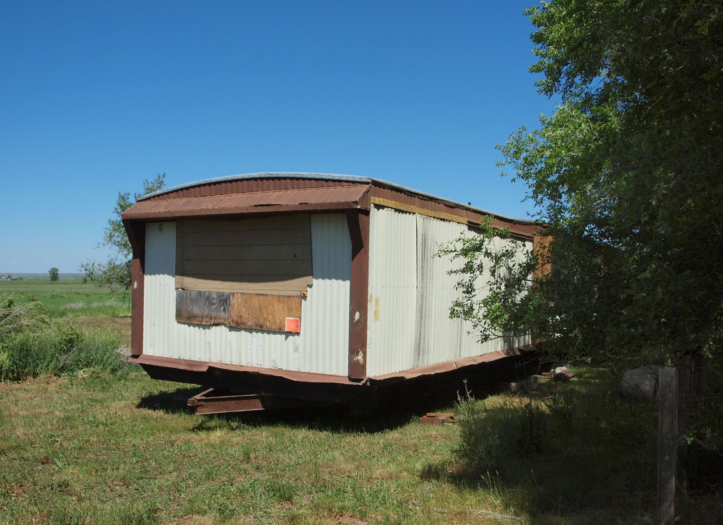 Trashed Single Wide Mobile Home