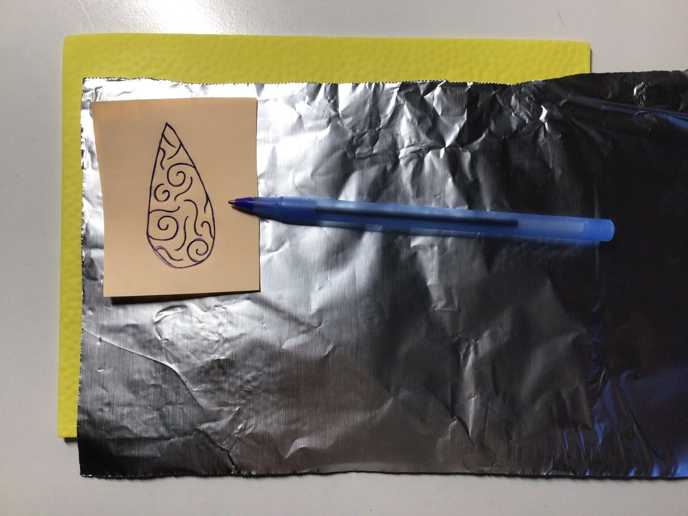 Embossed Tinfoil Earrings! : 7 Steps (with Pictures) - Instructables