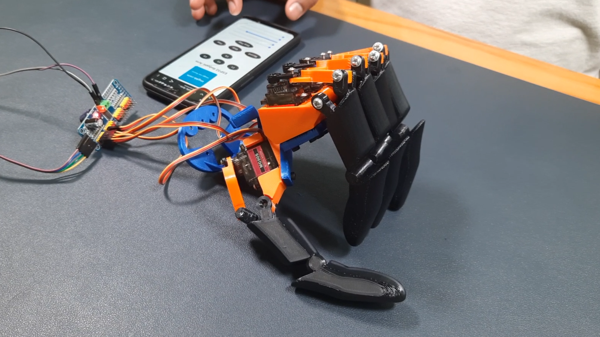 DIY 3D Printed Robotic Hand Controlled by Mobile | ESP32 + MG90 Servo ...
