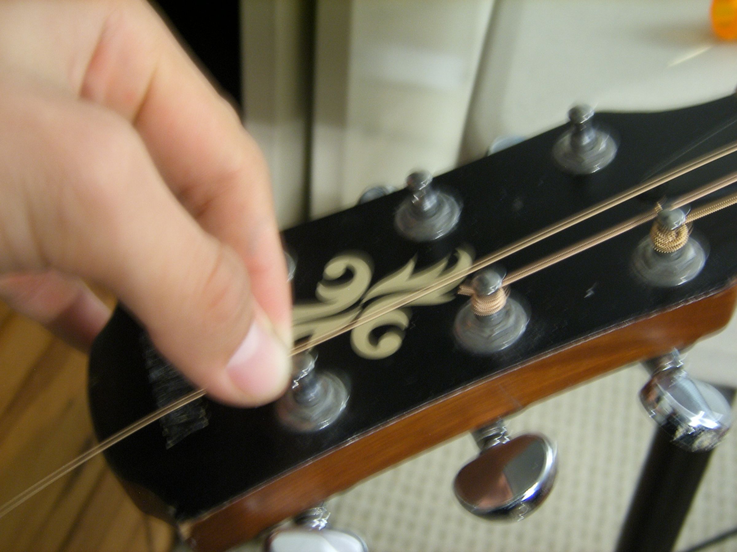 How to String a Guitar : 8 Steps (with Pictures) - Instructables