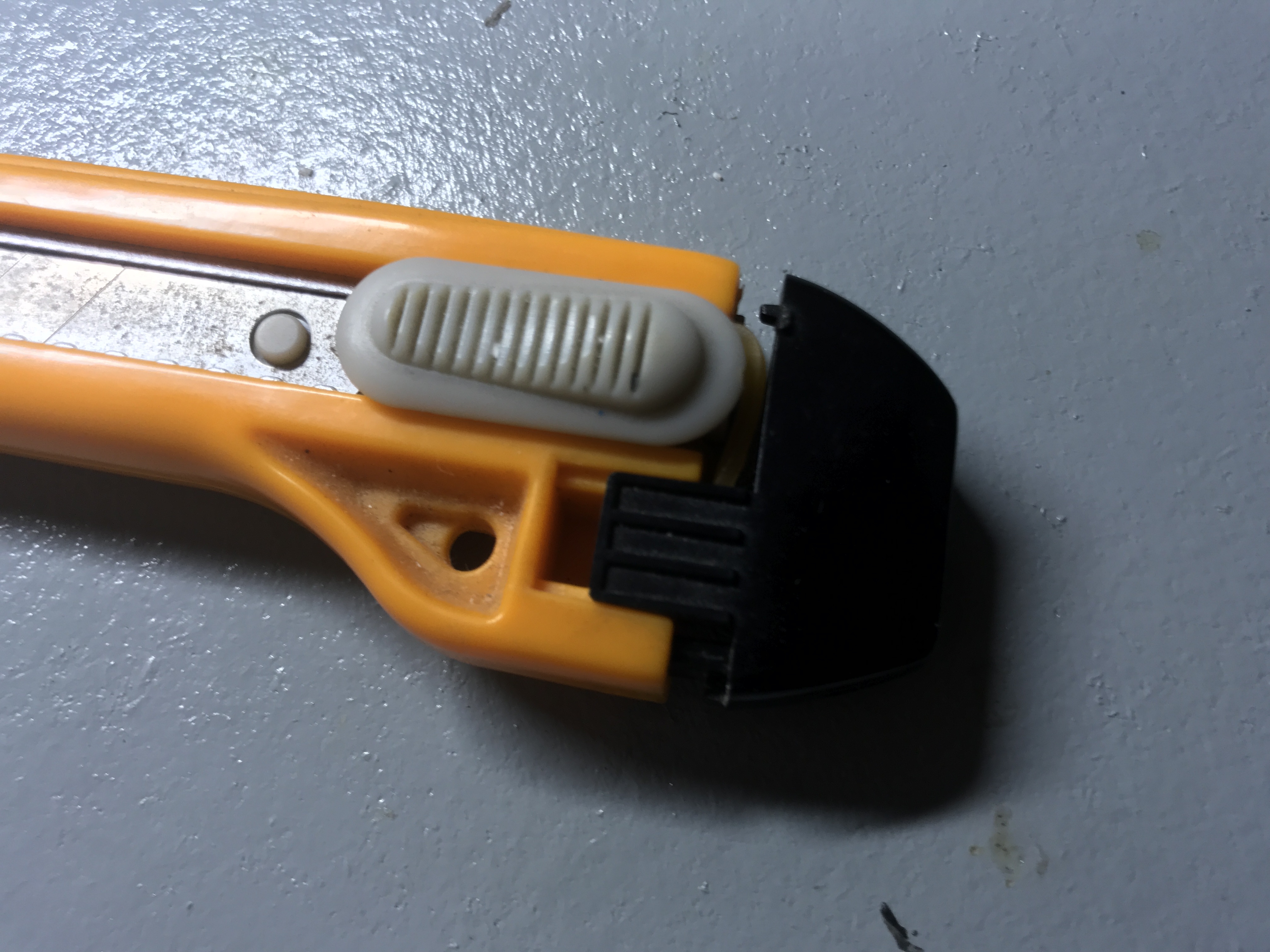 Self Retracting Box Cutter Using Rubber Band : 4 Steps - Instructables