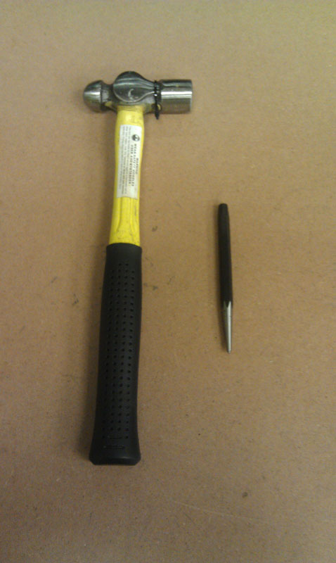 Hammerless center punch store