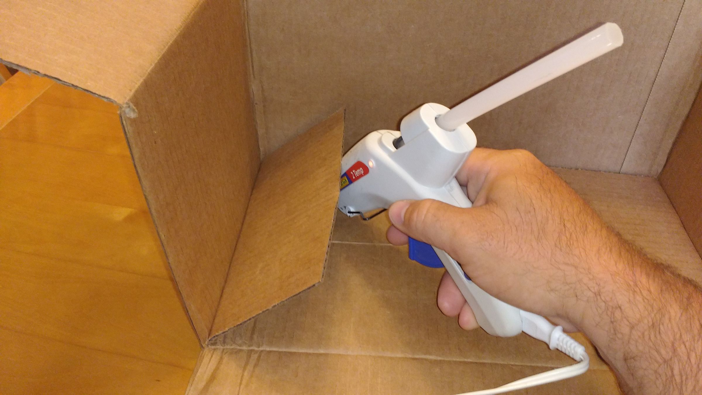 Make a Free/Inexpensive Fishing Rod Wrapping Jig Out of a Cardboard Box ...