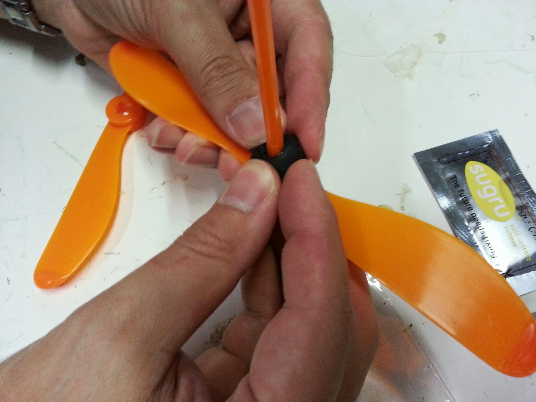 Use Sugru to Upgrade a Hand Copter Toy - Instructables