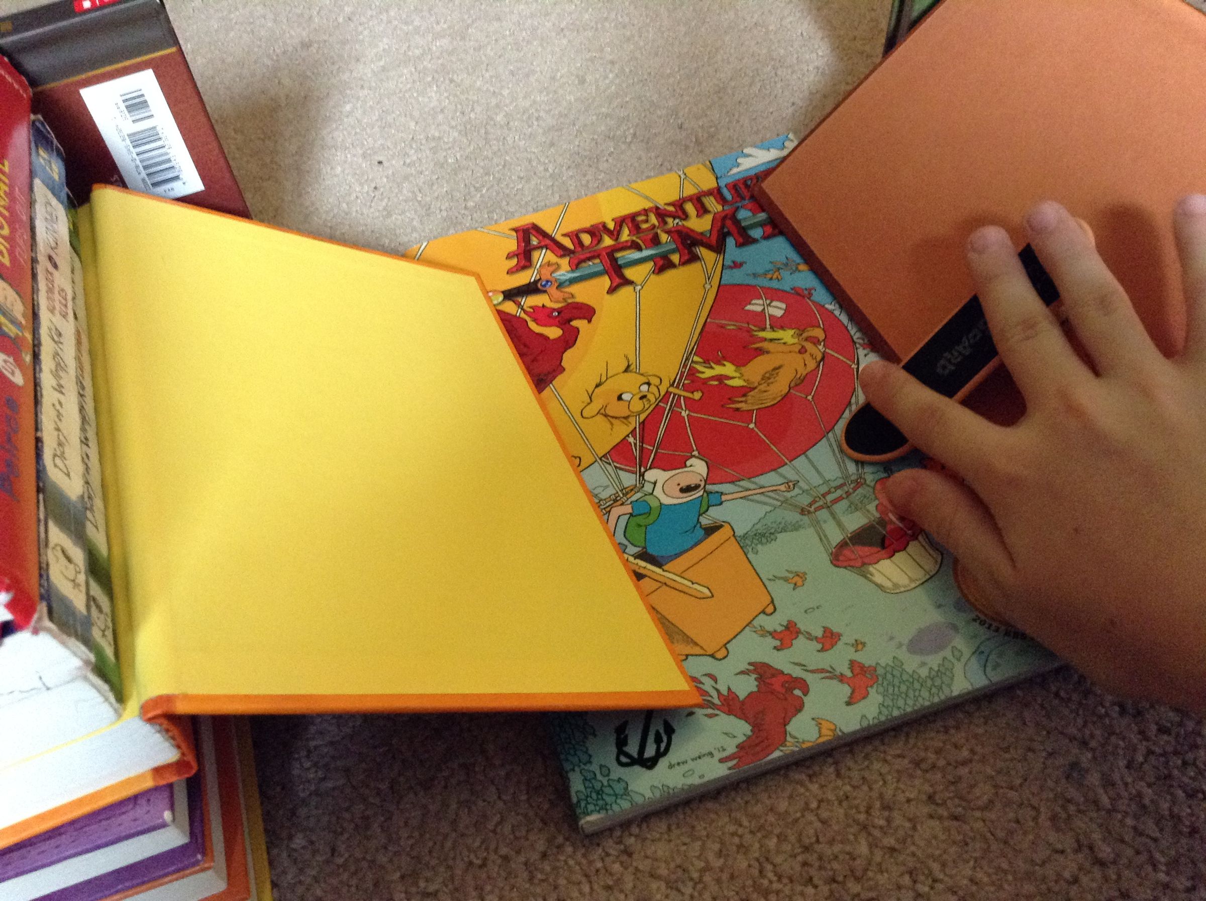 How to Make a Fingerboard Half Pipe Ramp With Books - Instructables