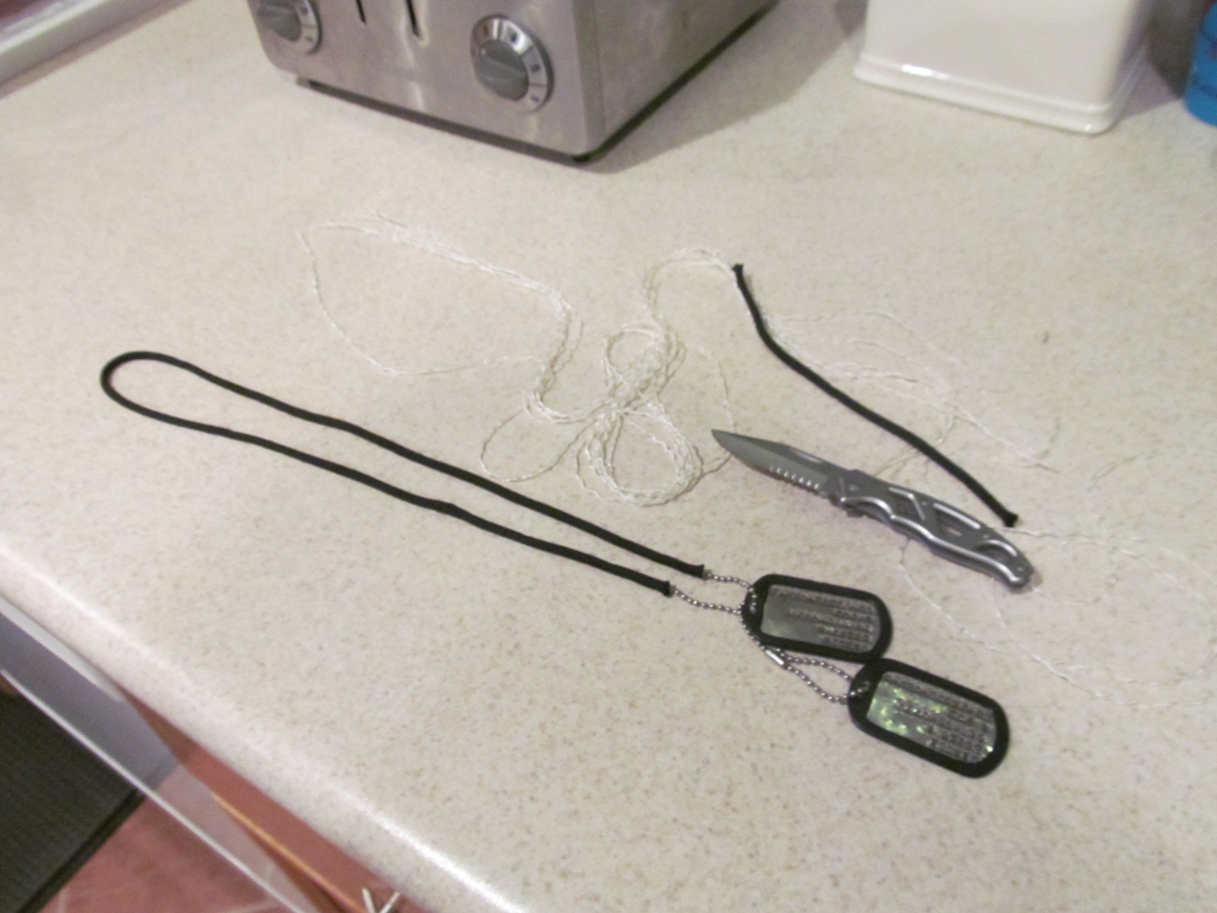 How to Sheath Dog Tags With Paracord. - Instructables