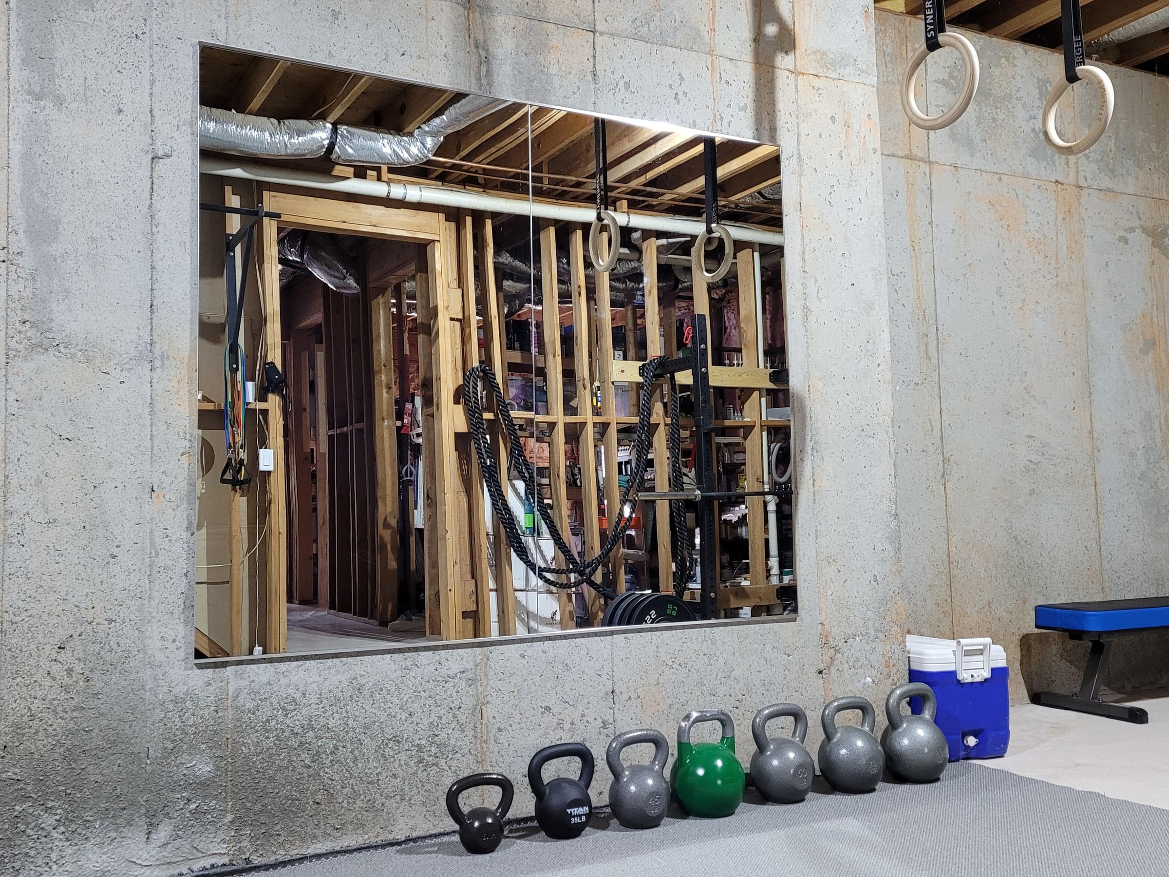How to Hang a Mirror on a Cement Wall: Expert Tips & Tricks - MirrorTopics