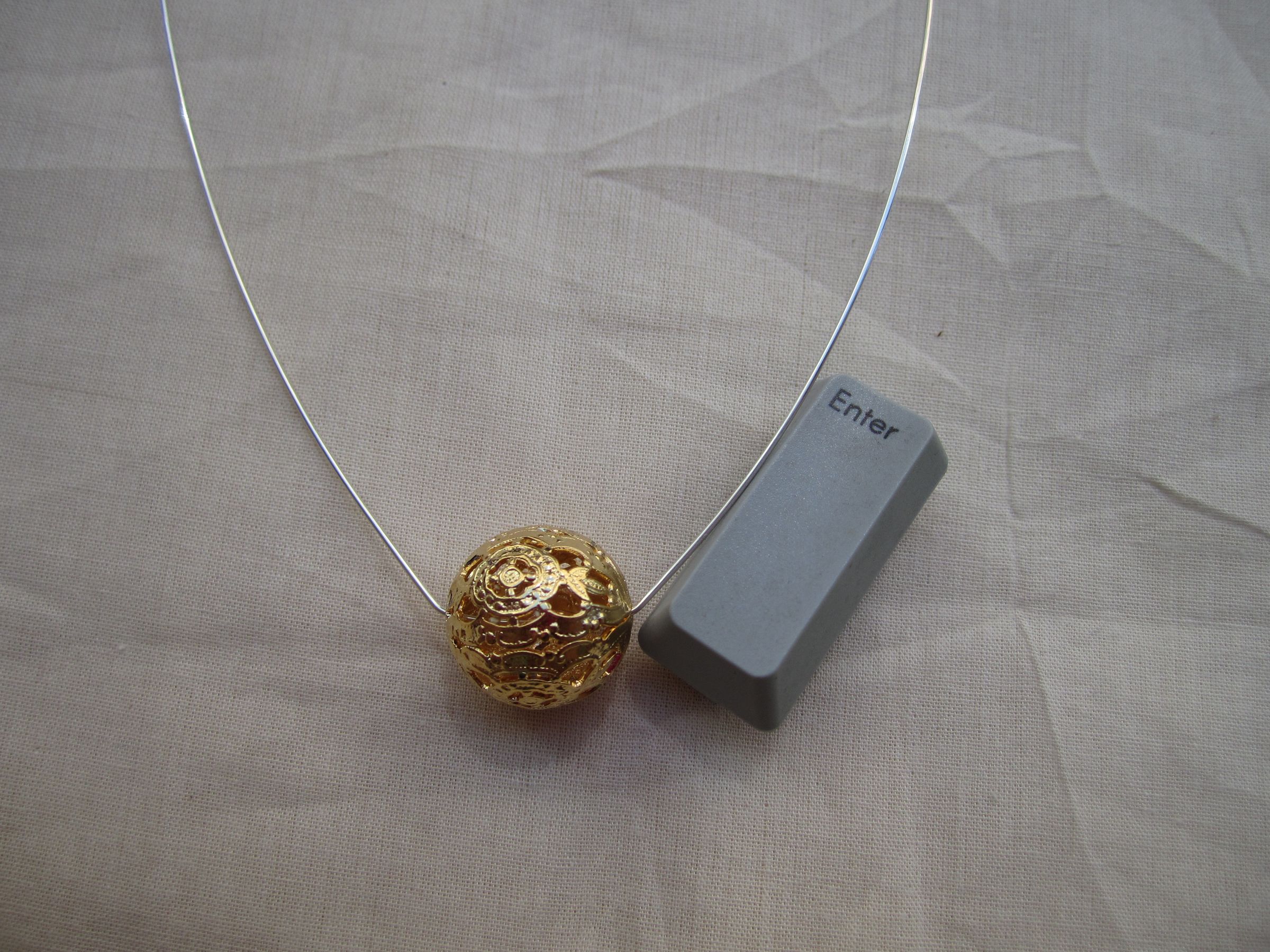 Make a Golden Snitch Necklace! : 9 Steps (with Pictures) - Instructables