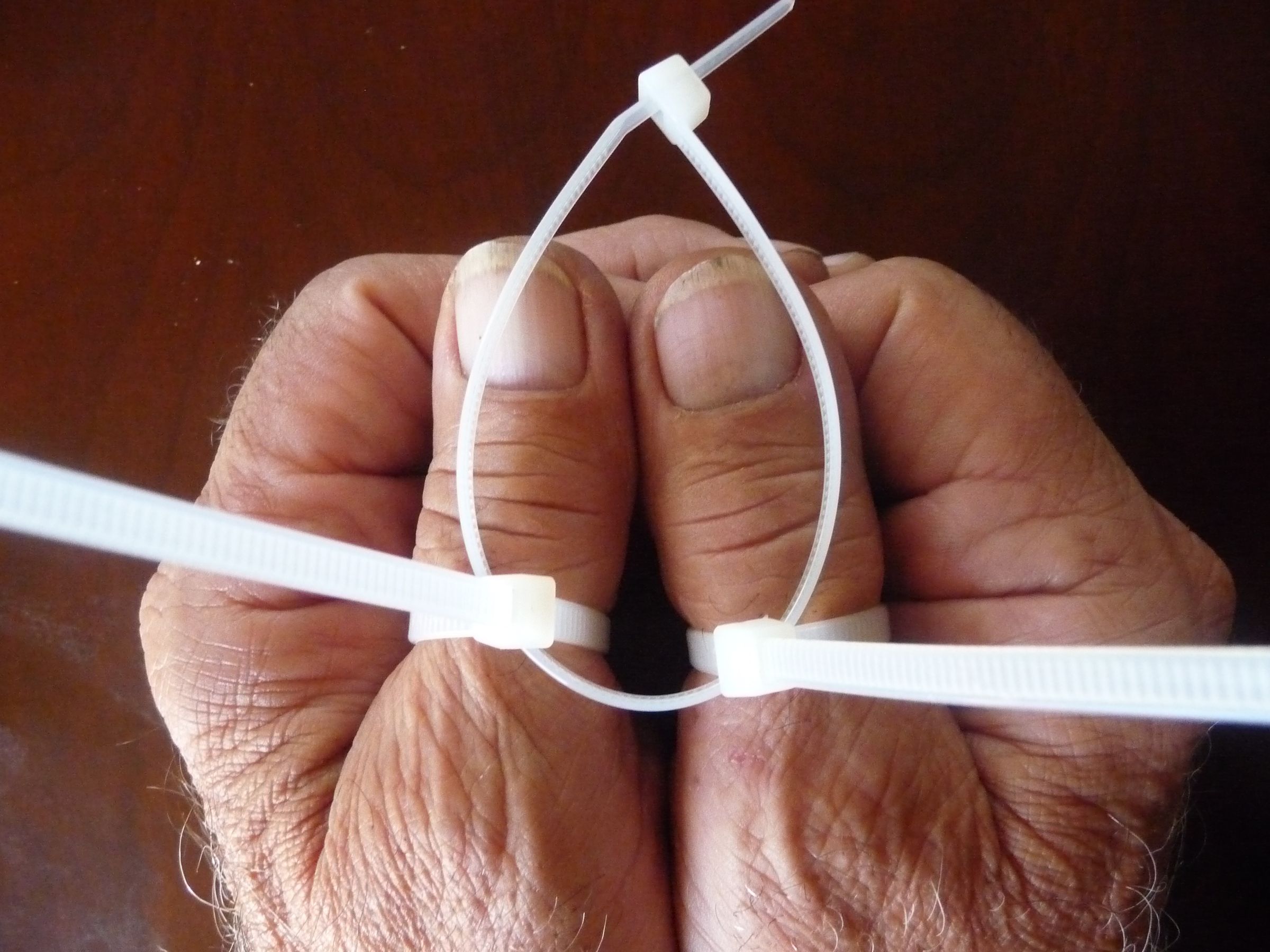 Zip Tie Thumb Cuffs : 3 Steps - Instructables