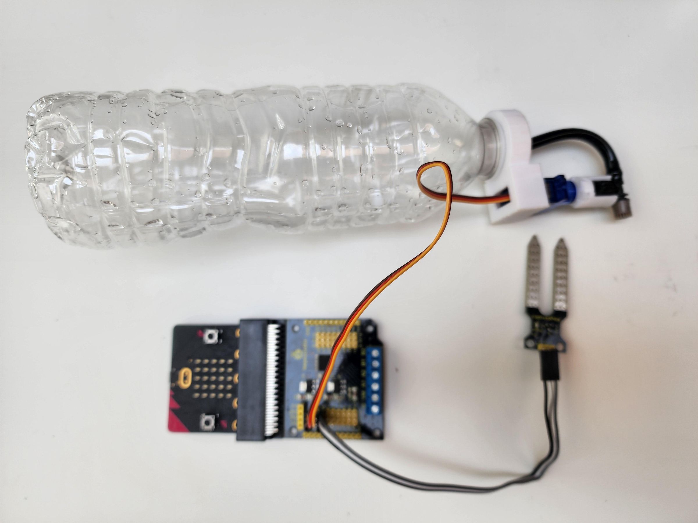 Use Plastic Bottle to Make Automatic Plant Watering System. : 8 Steps ...