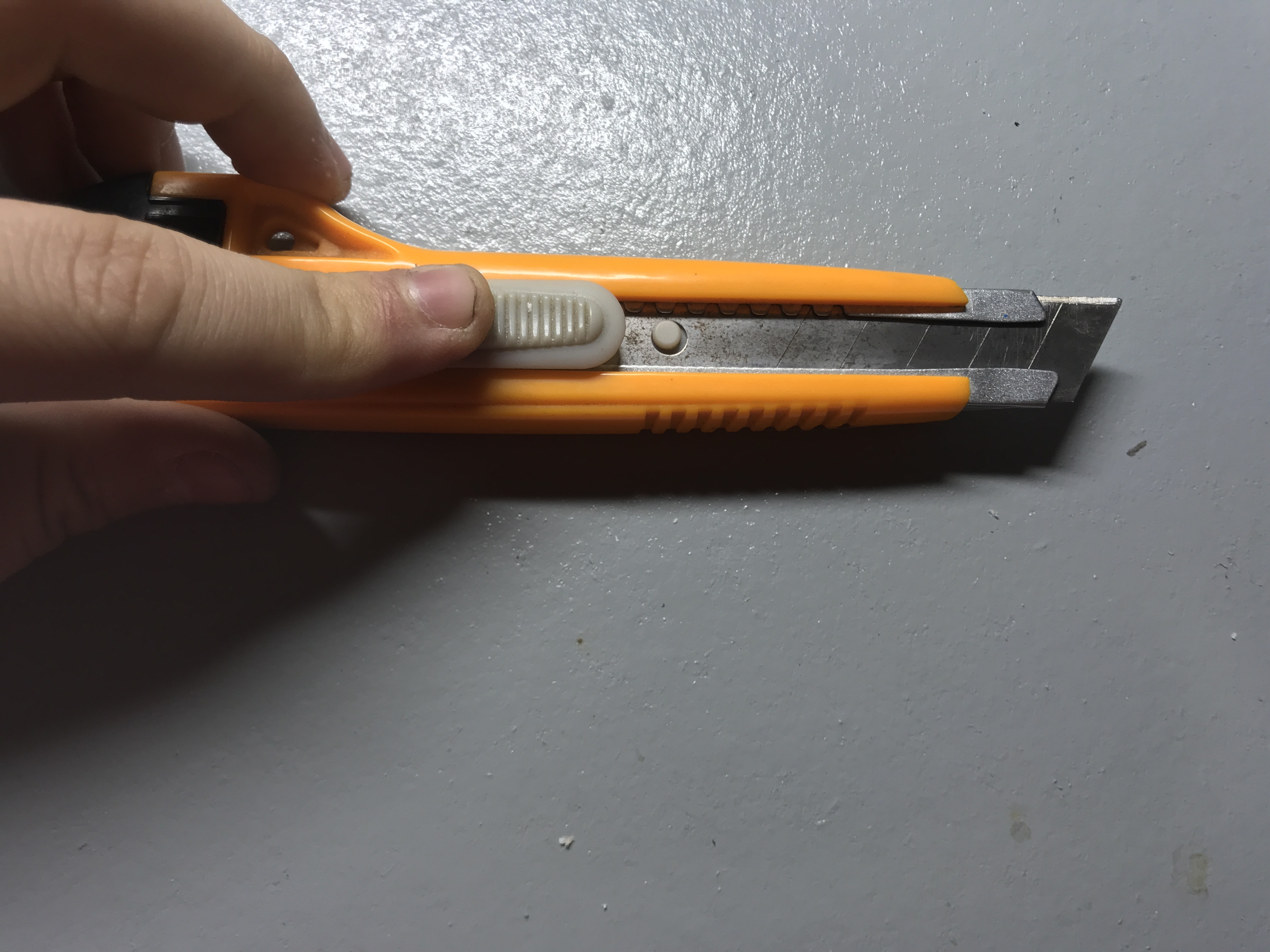 Self Retracting Box Cutter Using Rubber Band : 4 Steps - Instructables