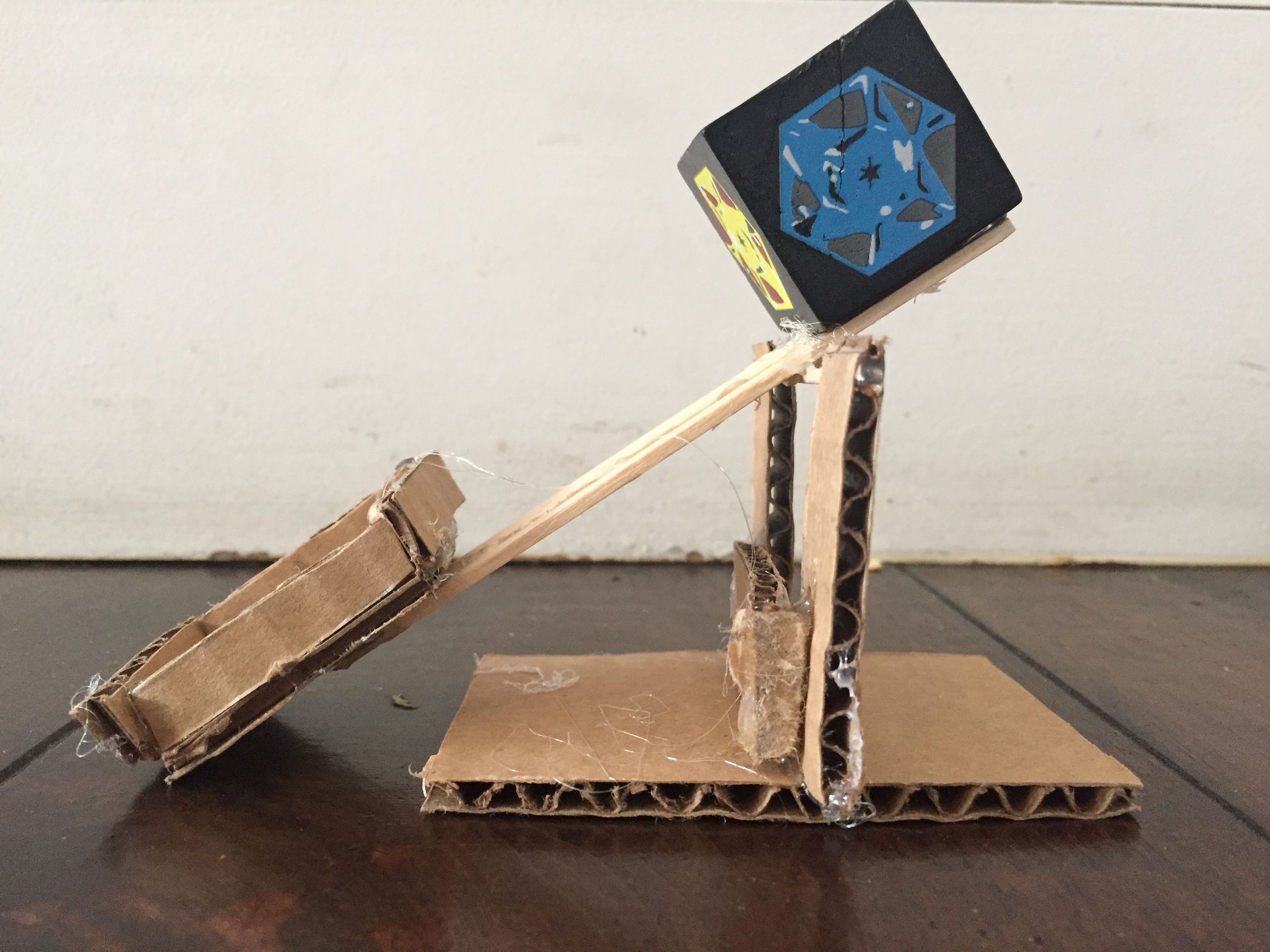 Mini Cardboard Trebuchet : 4 Steps - Instructables