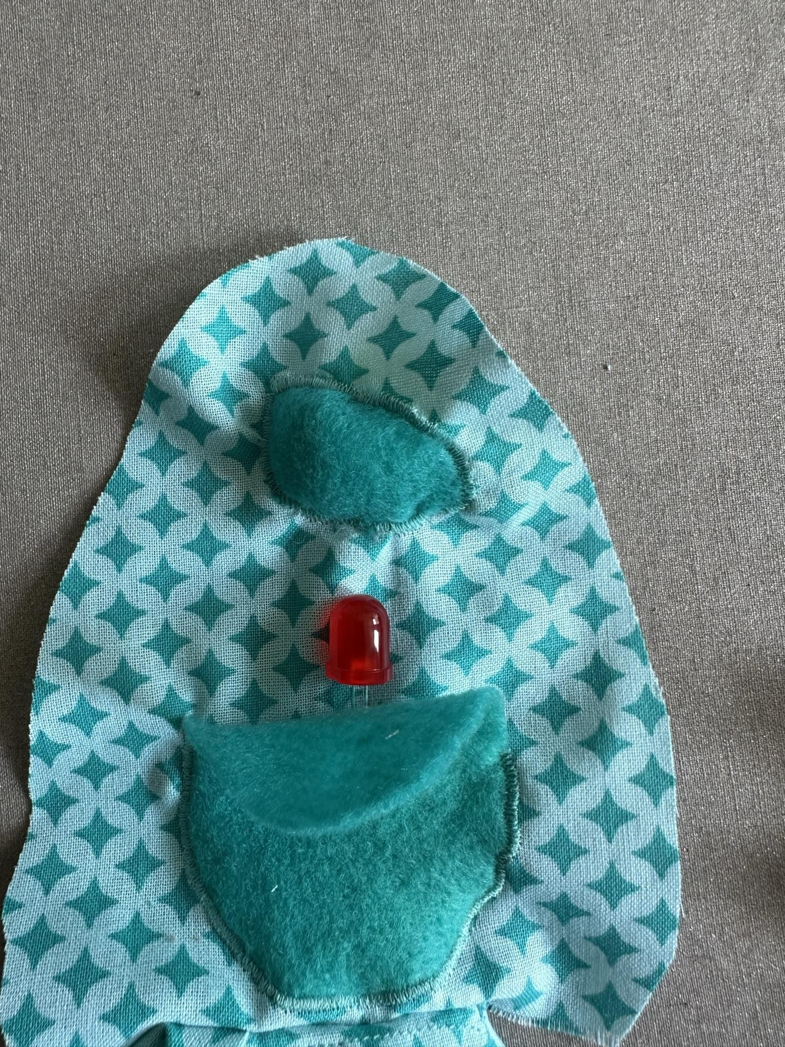 Soft-sensor-saurus | an E-textile Soft Sensor Soft Toy With LED Light ...