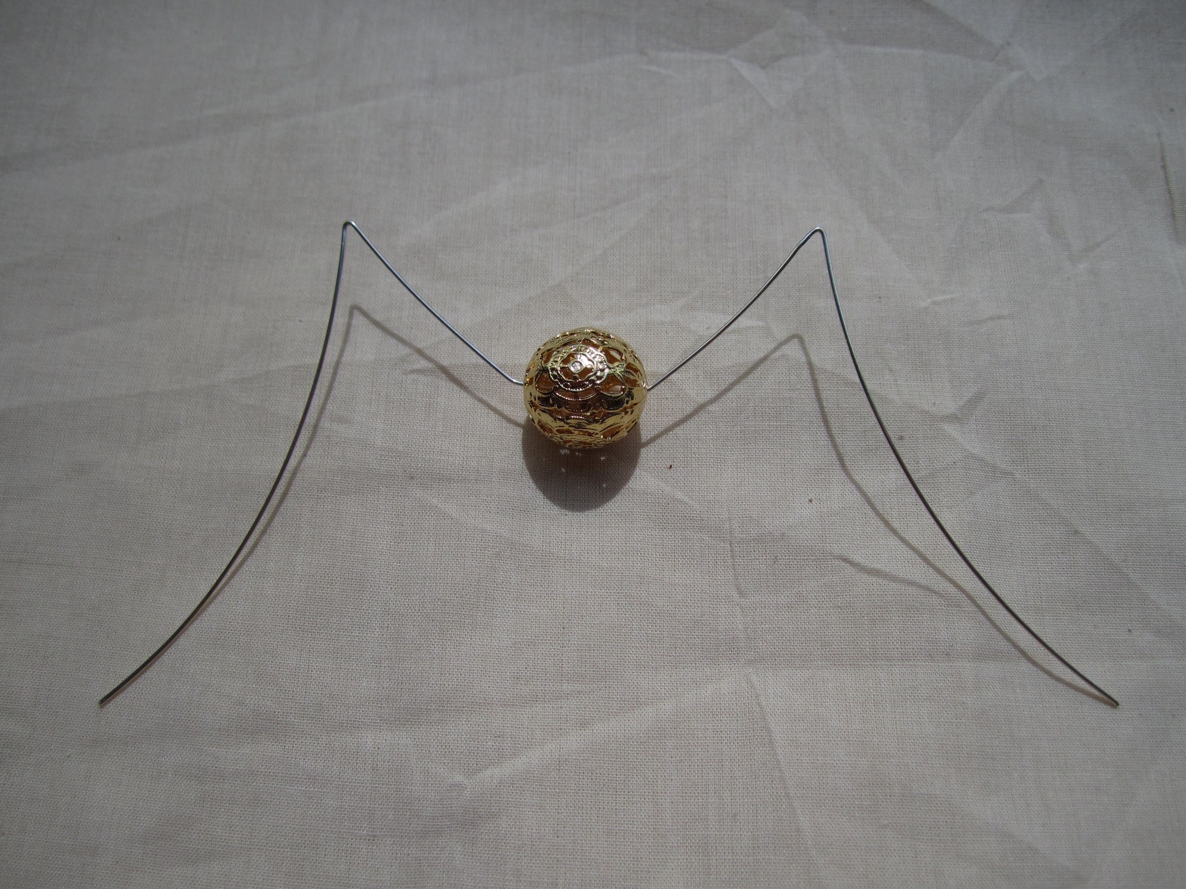 Make a Golden Snitch Necklace! : 9 Steps (with Pictures) - Instructables