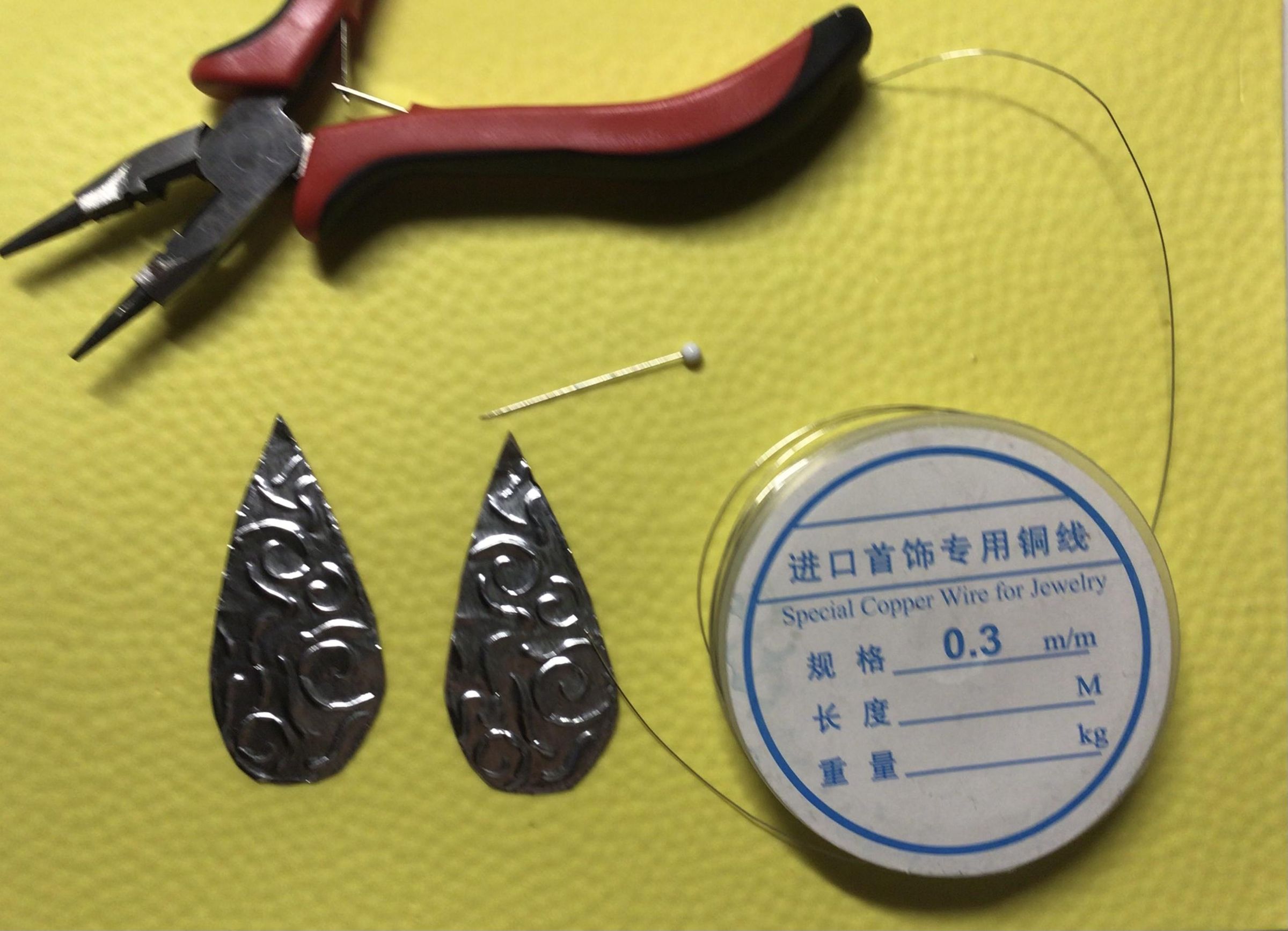 Embossed Tinfoil Earrings! : 7 Steps (with Pictures) - Instructables