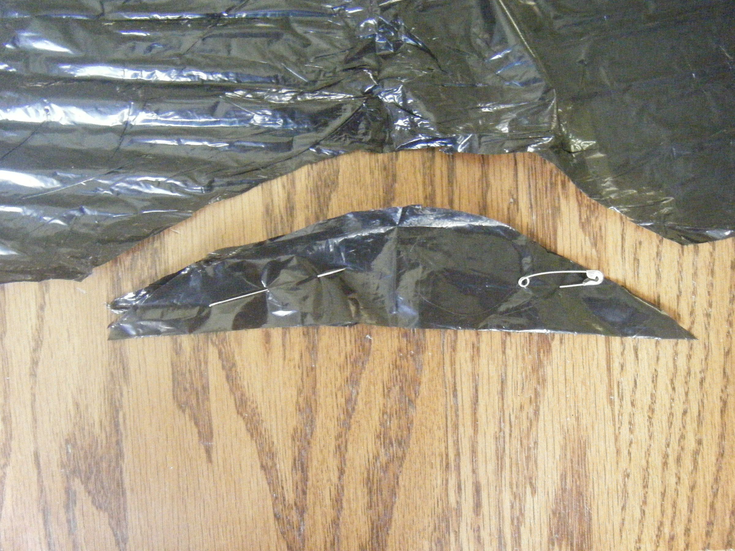 Inverness Cape From Garbage Bags : 7 Steps - Instructables