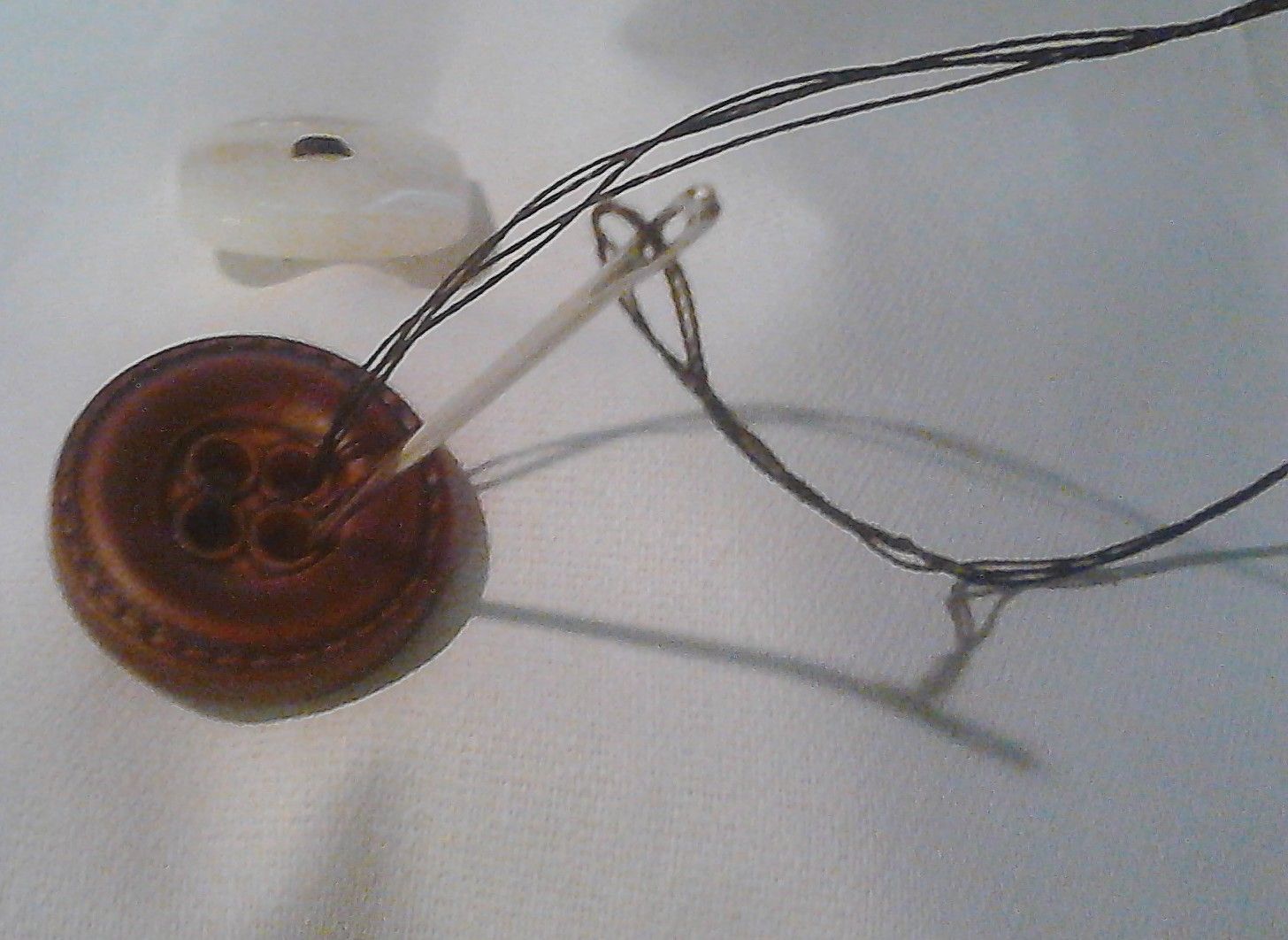 How to Professionally Sew on a Button by Hand : 14 Steps - Instructables