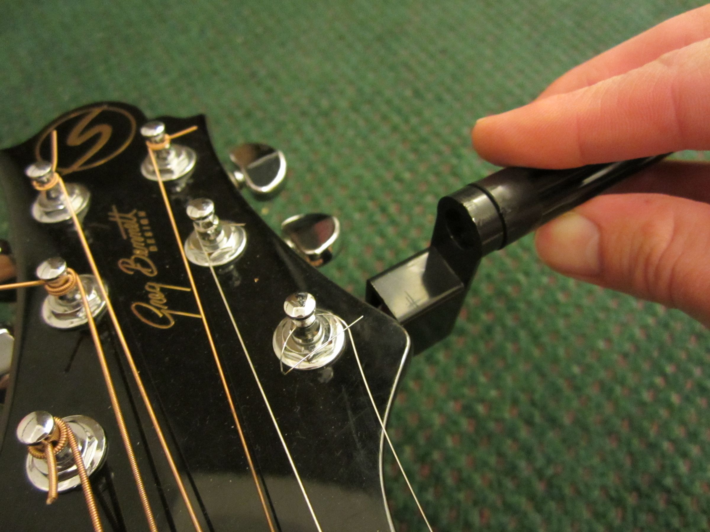 How to Re-String an Acoustic Guitar : 6 Steps - Instructables
