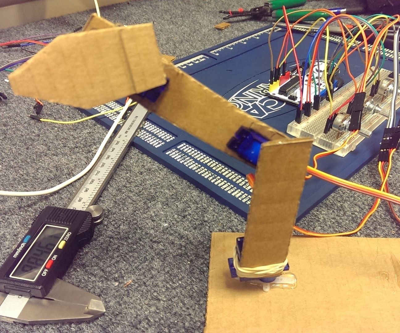 Simple Robotic Arm Out of Cardboard Pieces : 4 Steps - Instructables