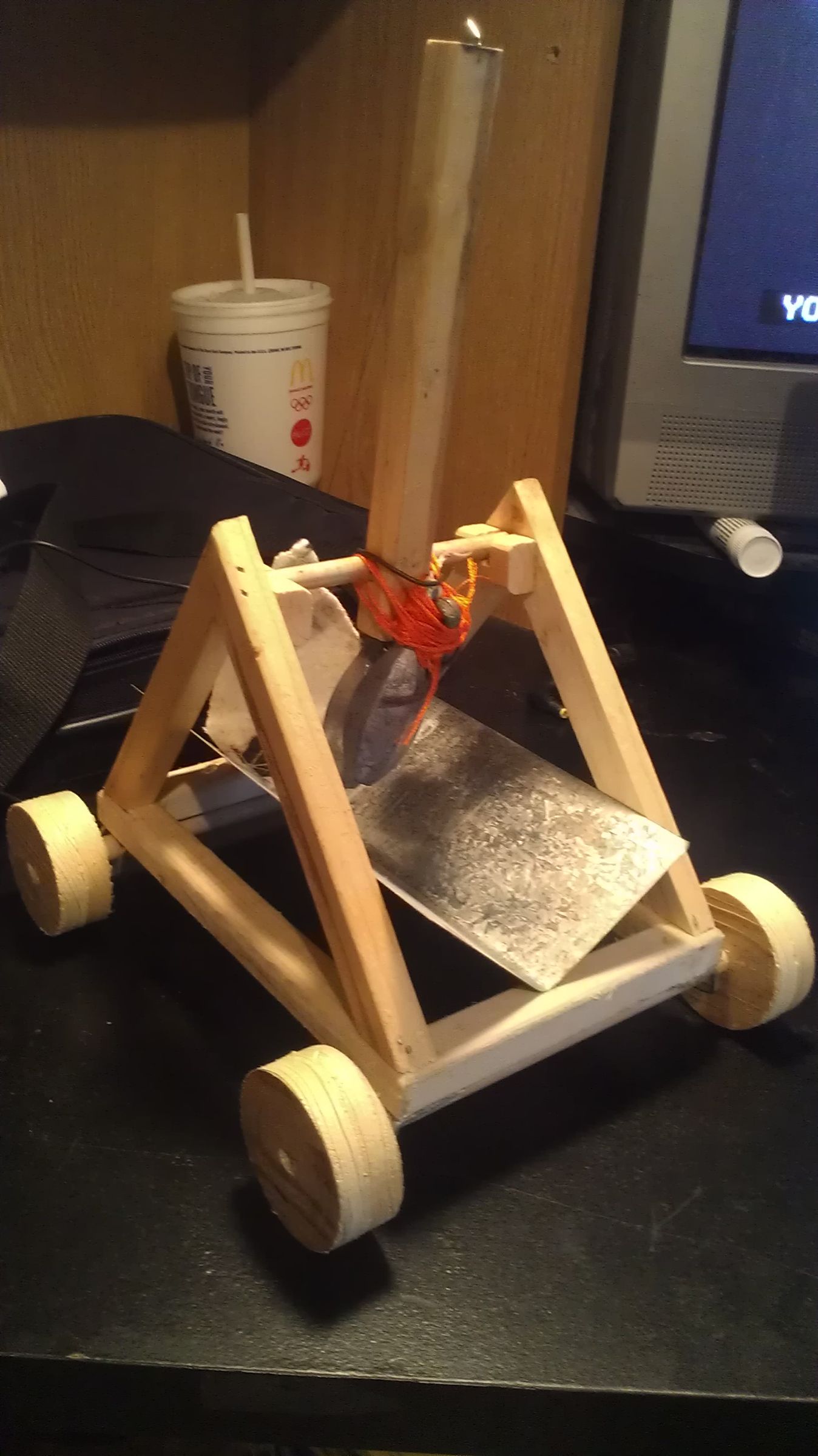 Wheels on a Desktop Trebuchet - Instructables