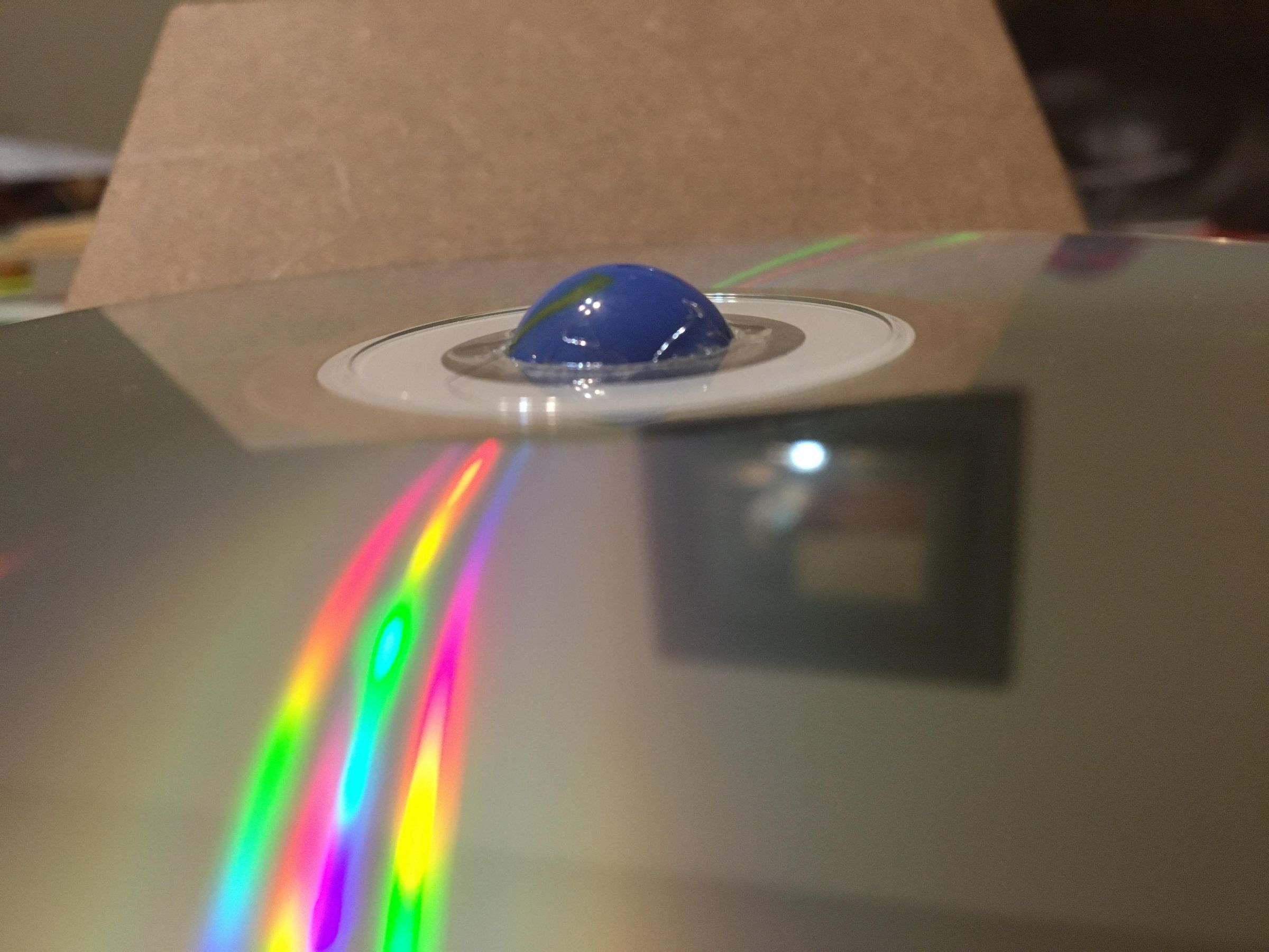 Simple 5 Minute Spin Top From a CD, a Marble or a Wood Button Plug and ...
