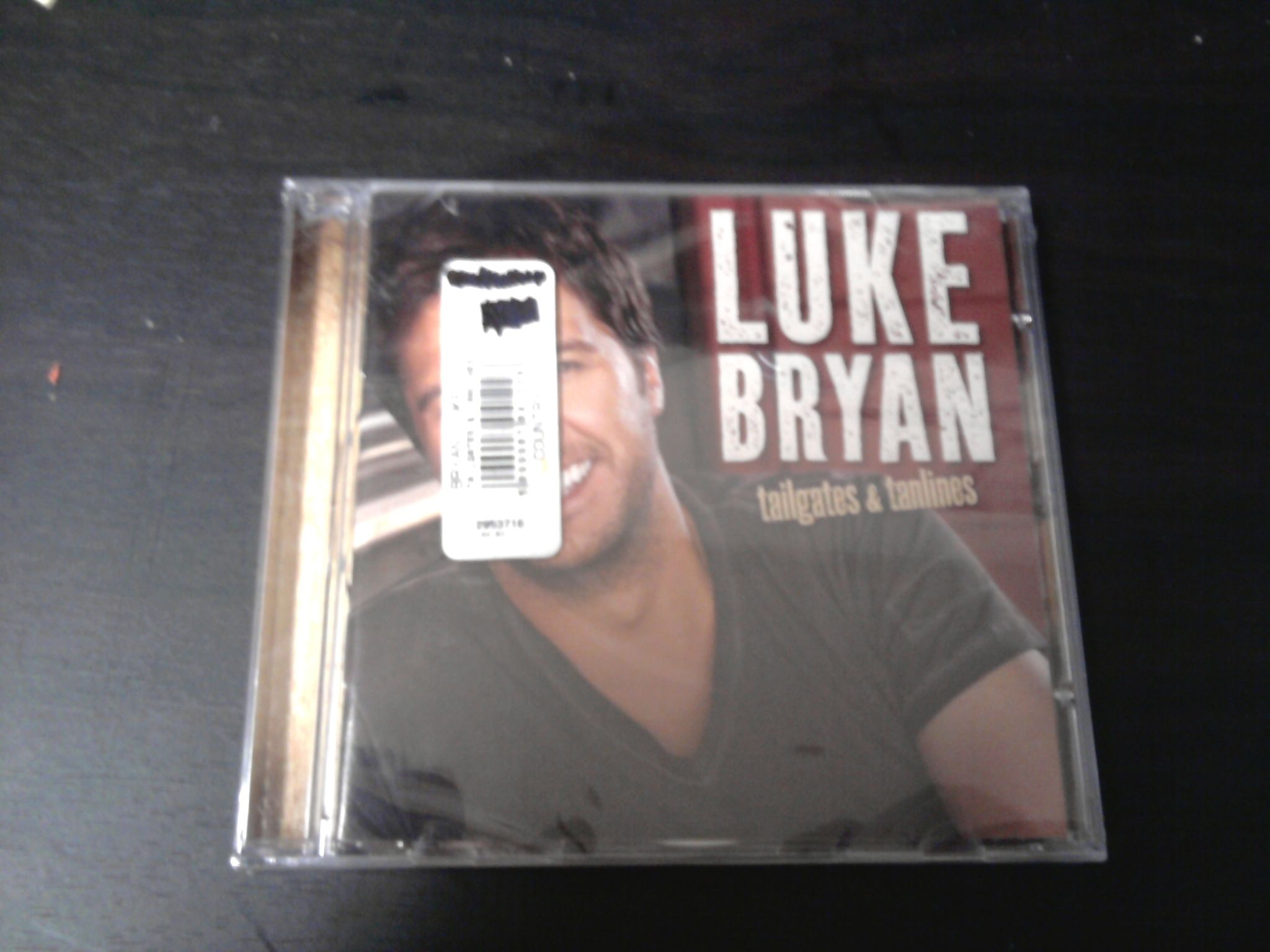 How to Open a New CD Without Any Sharp Objects : 10 Steps - Instructables