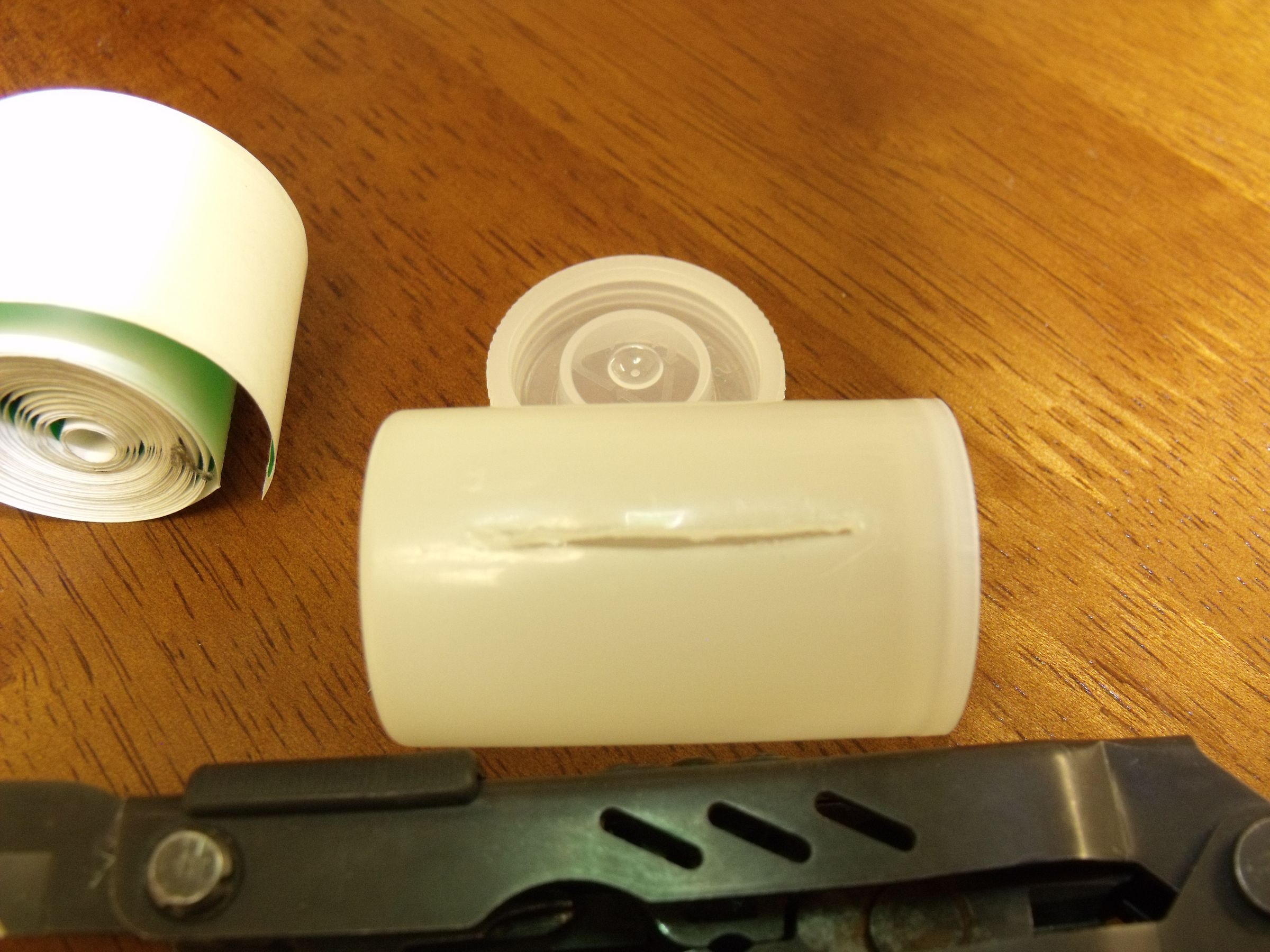 Make a Sticker Dispenser Out of a Film Container : 4 Steps - Instructables