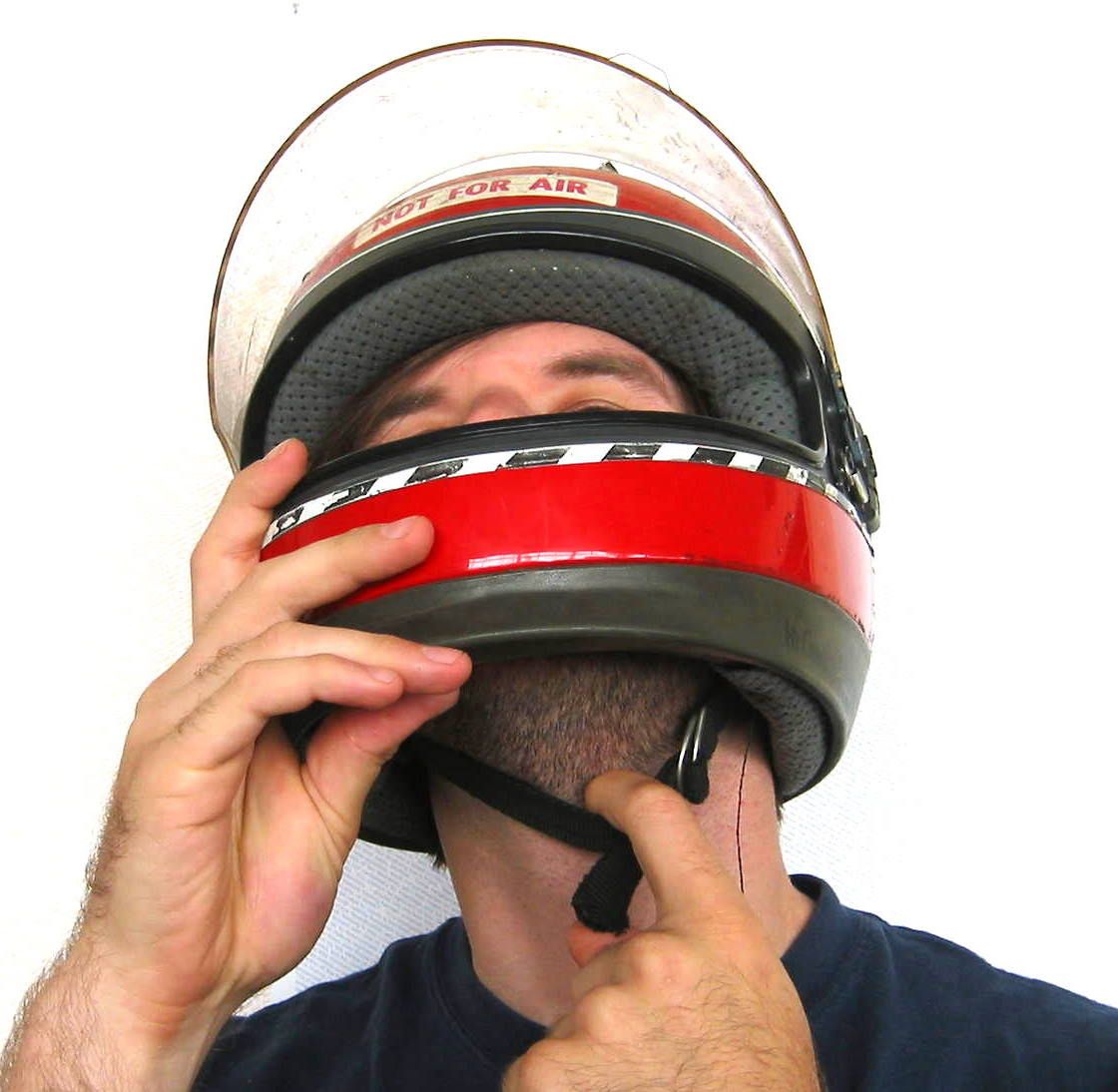 Put on a Motorcycle Helmet Without Undoing the Strap (with Pictures ...