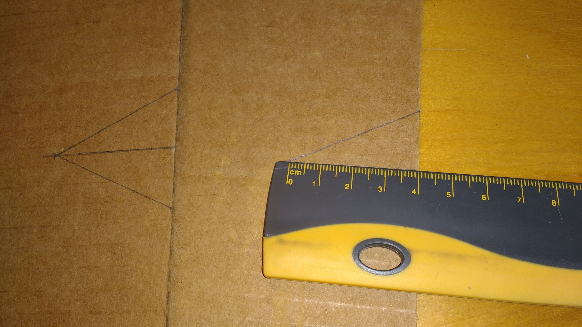 Make a Free/Inexpensive Fishing Rod Wrapping Jig Out of a Cardboard Box ...