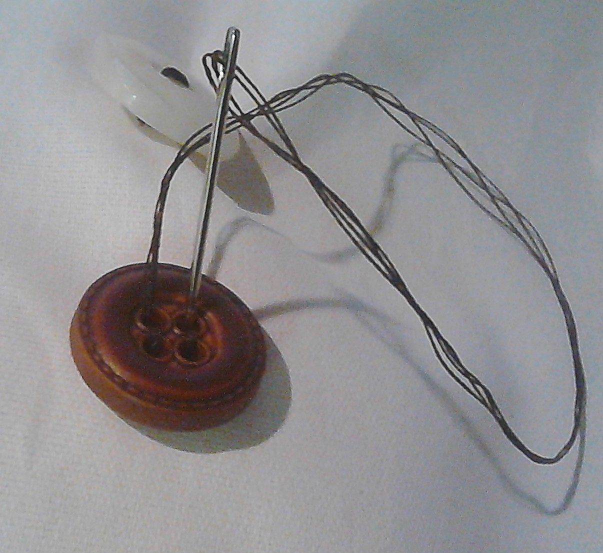 How to Professionally Sew on a Button by Hand : 14 Steps - Instructables