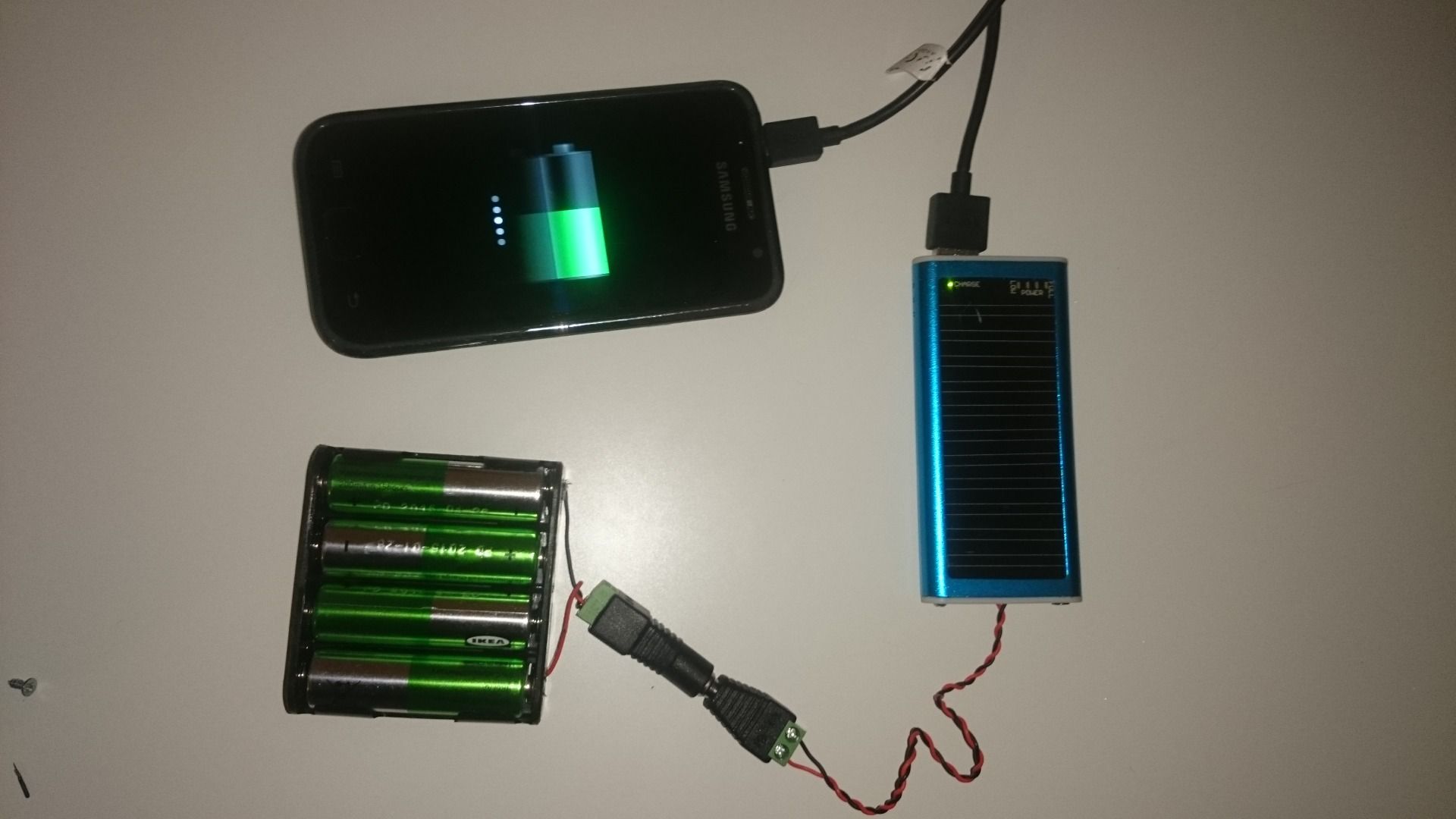 Old Solar Phone Charger to Charge From and the AA Batteries. : 3 Steps ...