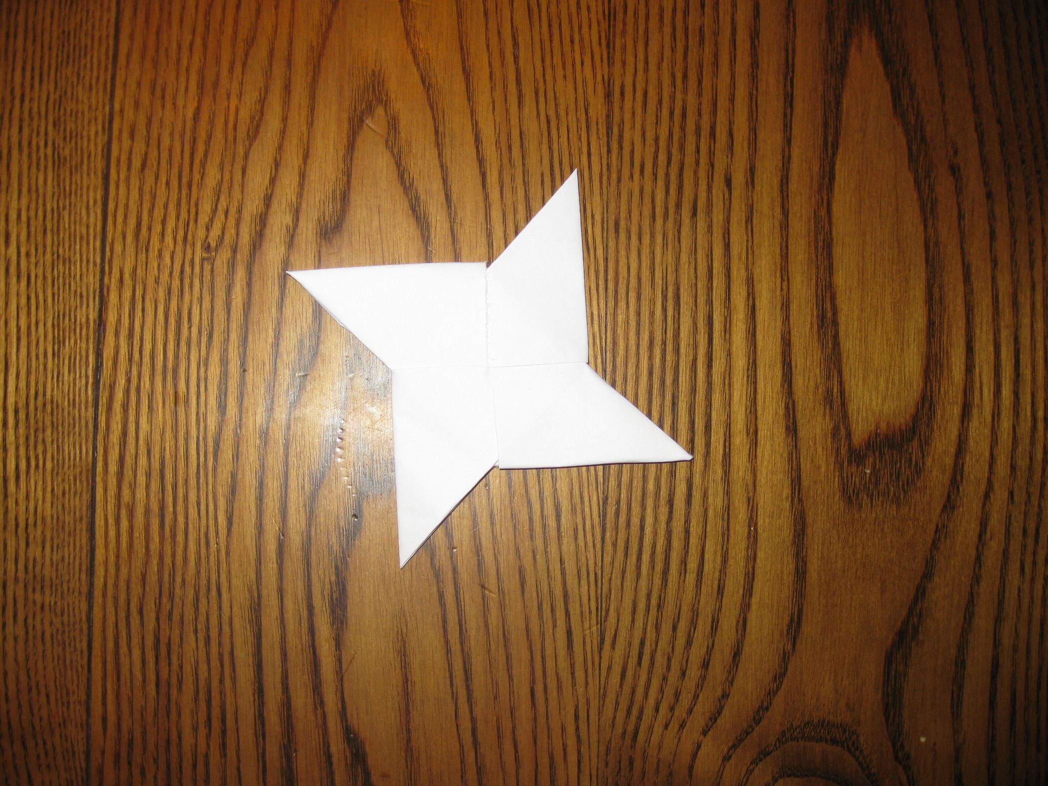 The Easiest Way to Make a Paper Ninja Star : 7 Steps - Instructables