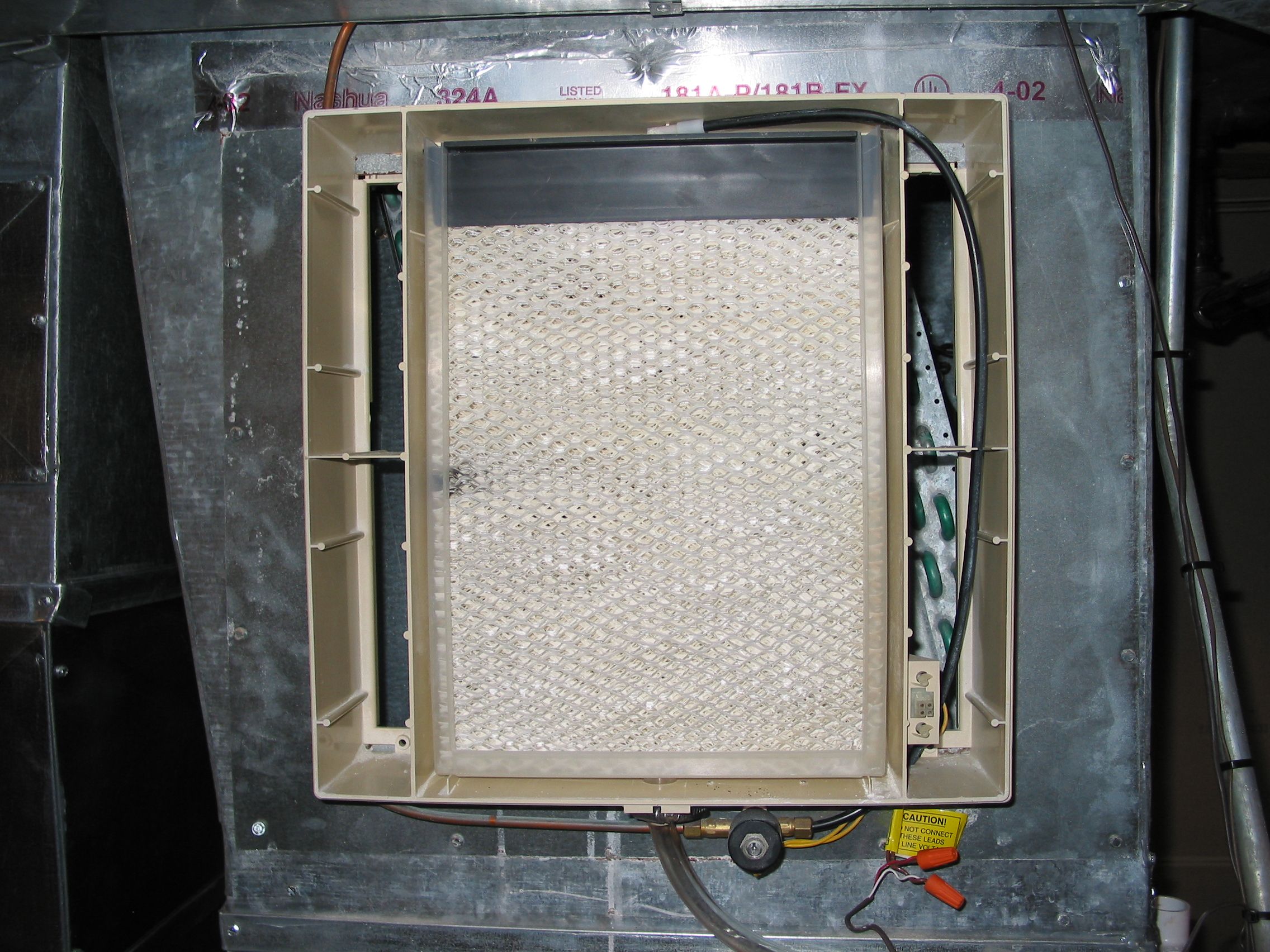 Troubleshoot and Repair a Furnace Mounted Humidifier : 4 Steps ...
