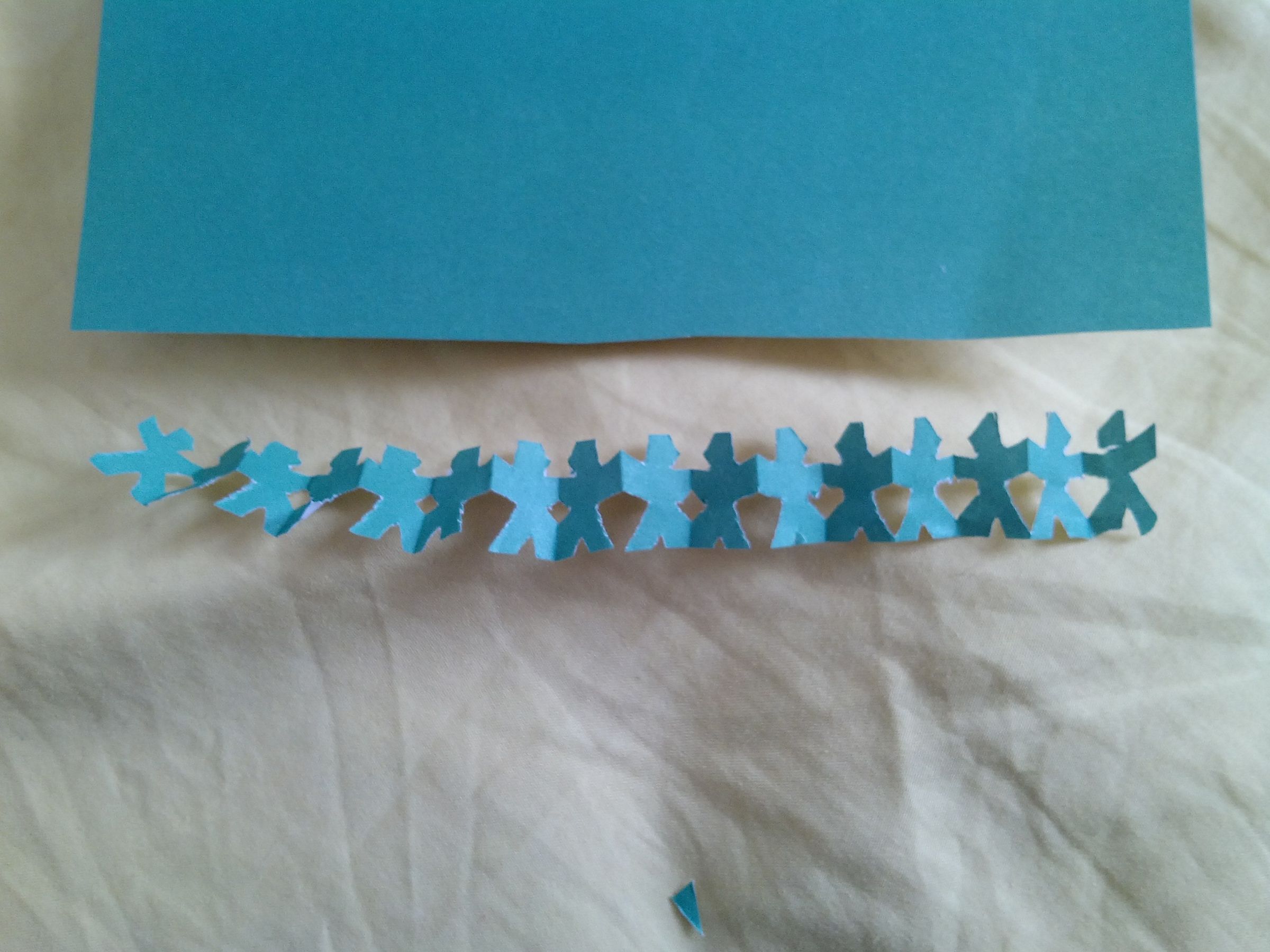 MINI But MIGHTY Paper Chain Man! : 8 Steps - Instructables