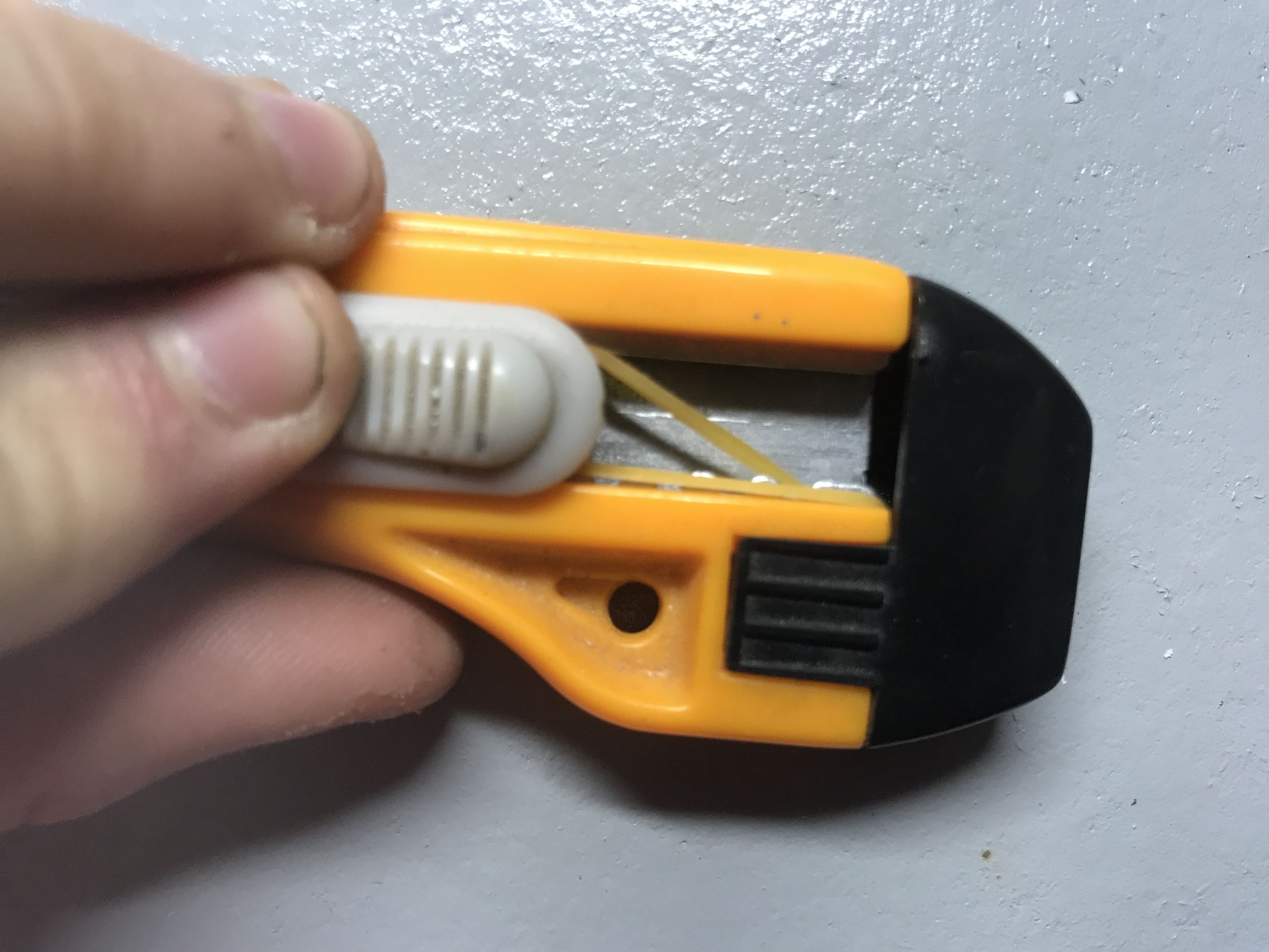 Self Retracting Box Cutter Using Rubber Band : 4 Steps - Instructables