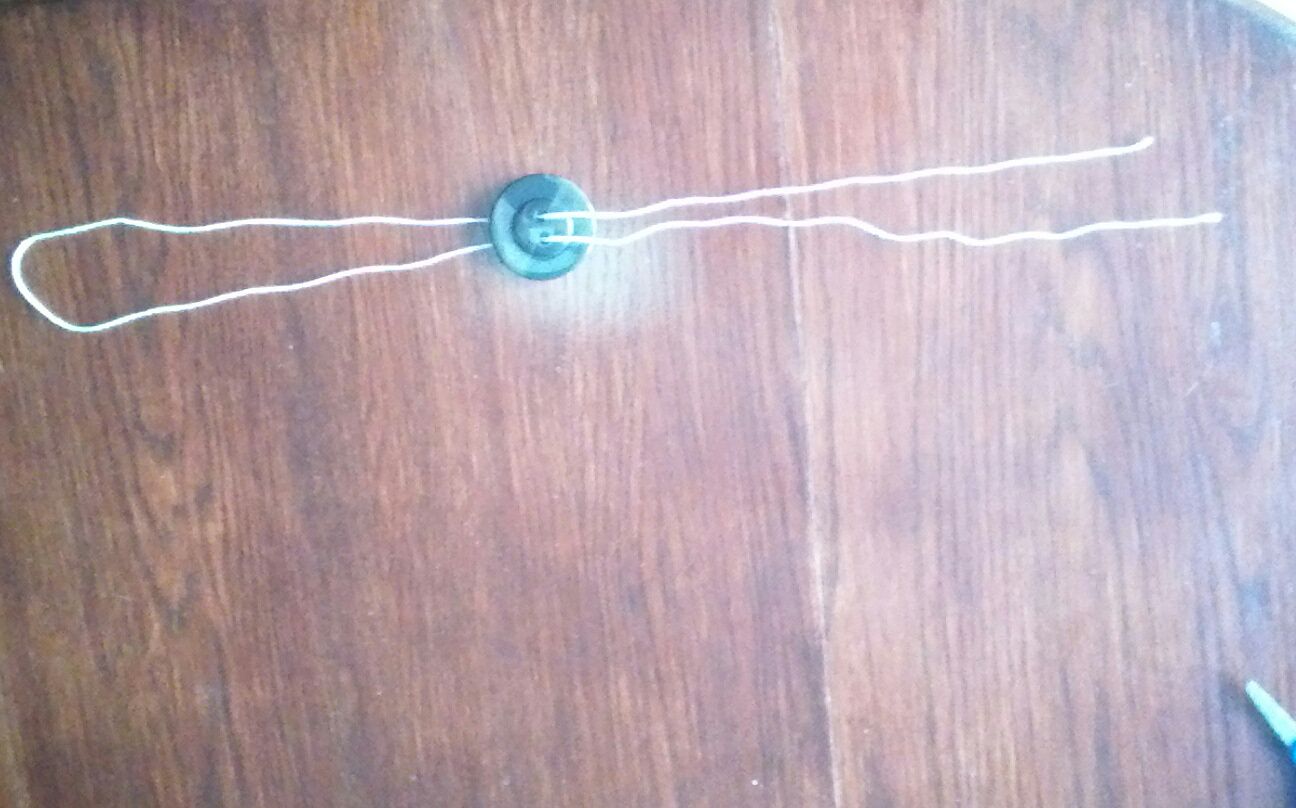 Spinning Button Toy : 6 Steps - Instructables