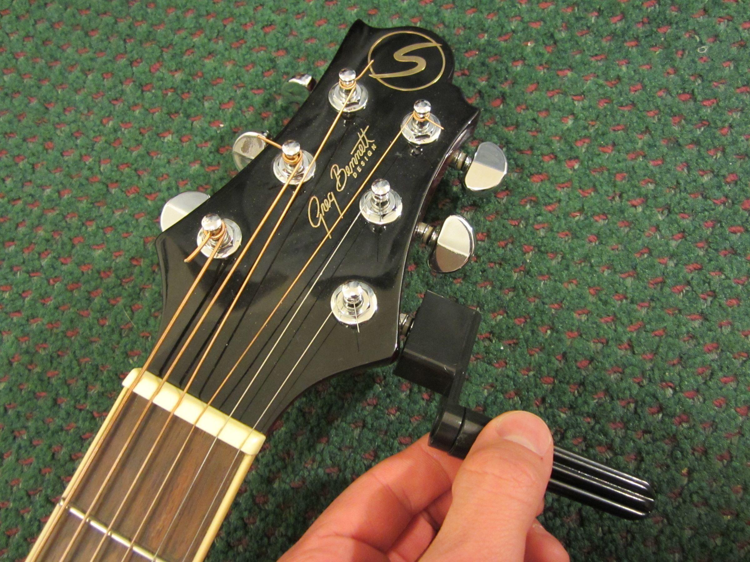 How to Re-String an Acoustic Guitar : 6 Steps - Instructables