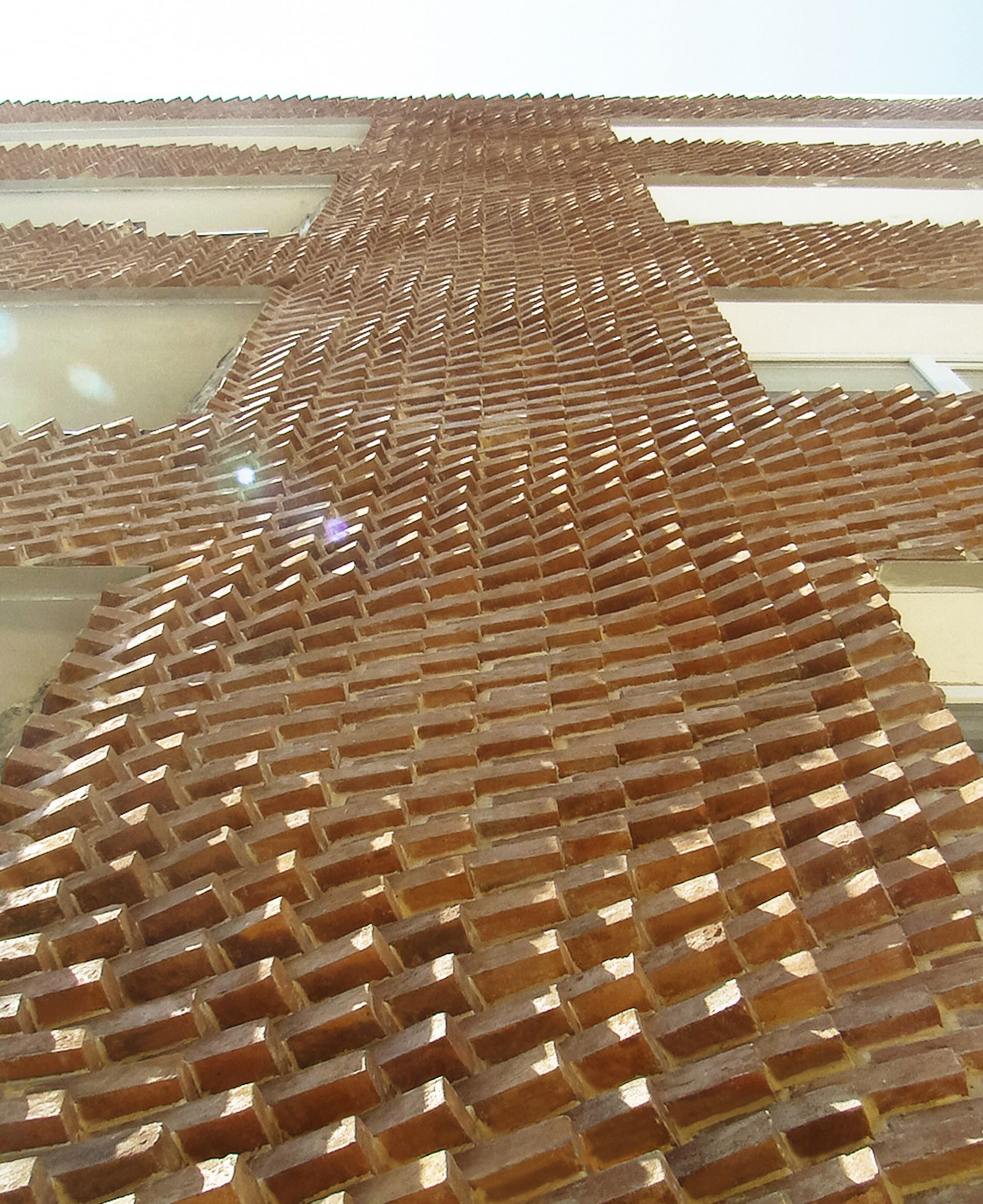 AN ON-SITE TECHNIQUE FOR PARAMETRIC BRICK WALLS WITH ROTATING BRICKS ...