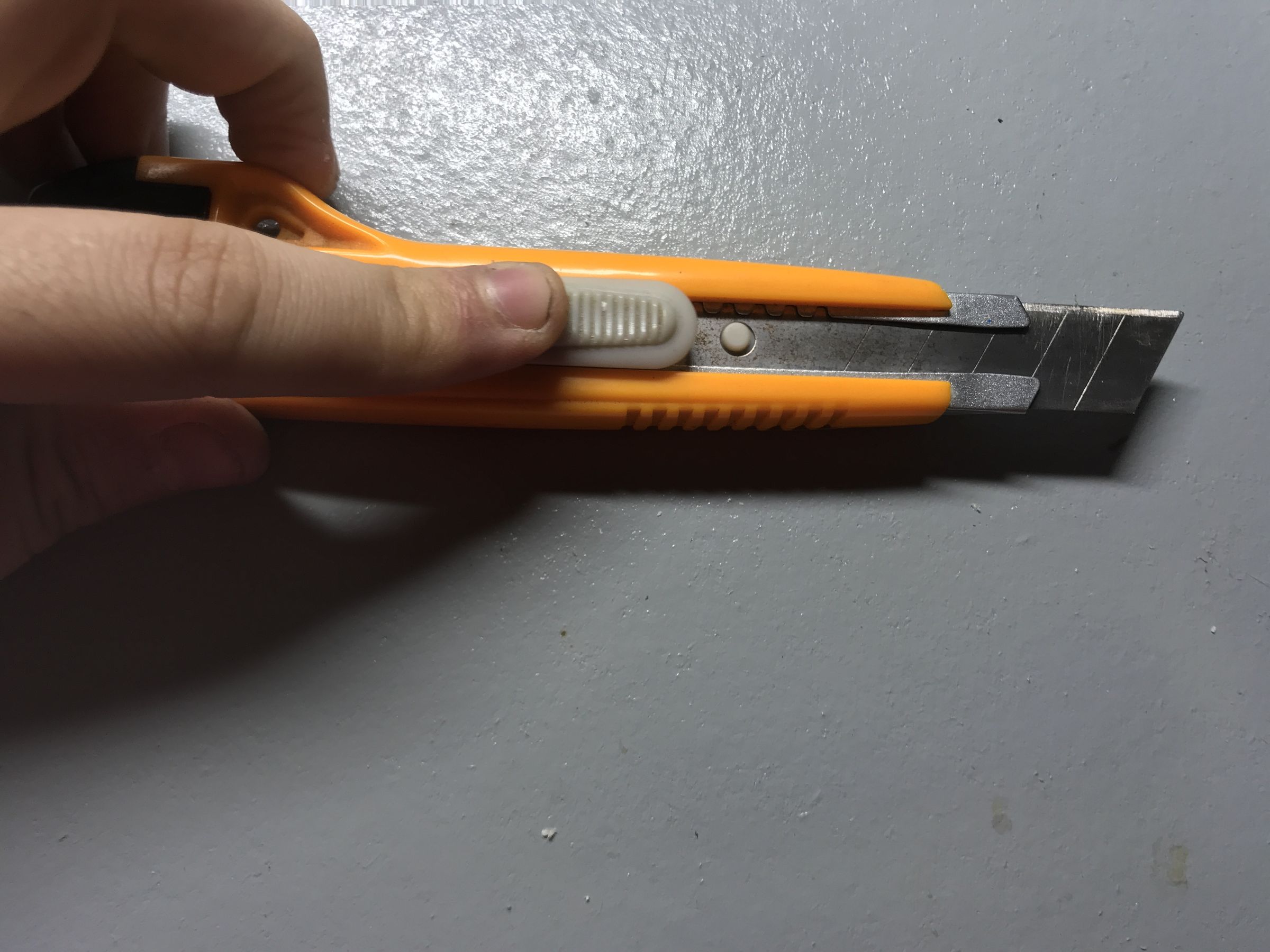 Self Retracting Box Cutter Using Rubber Band : 4 Steps - Instructables