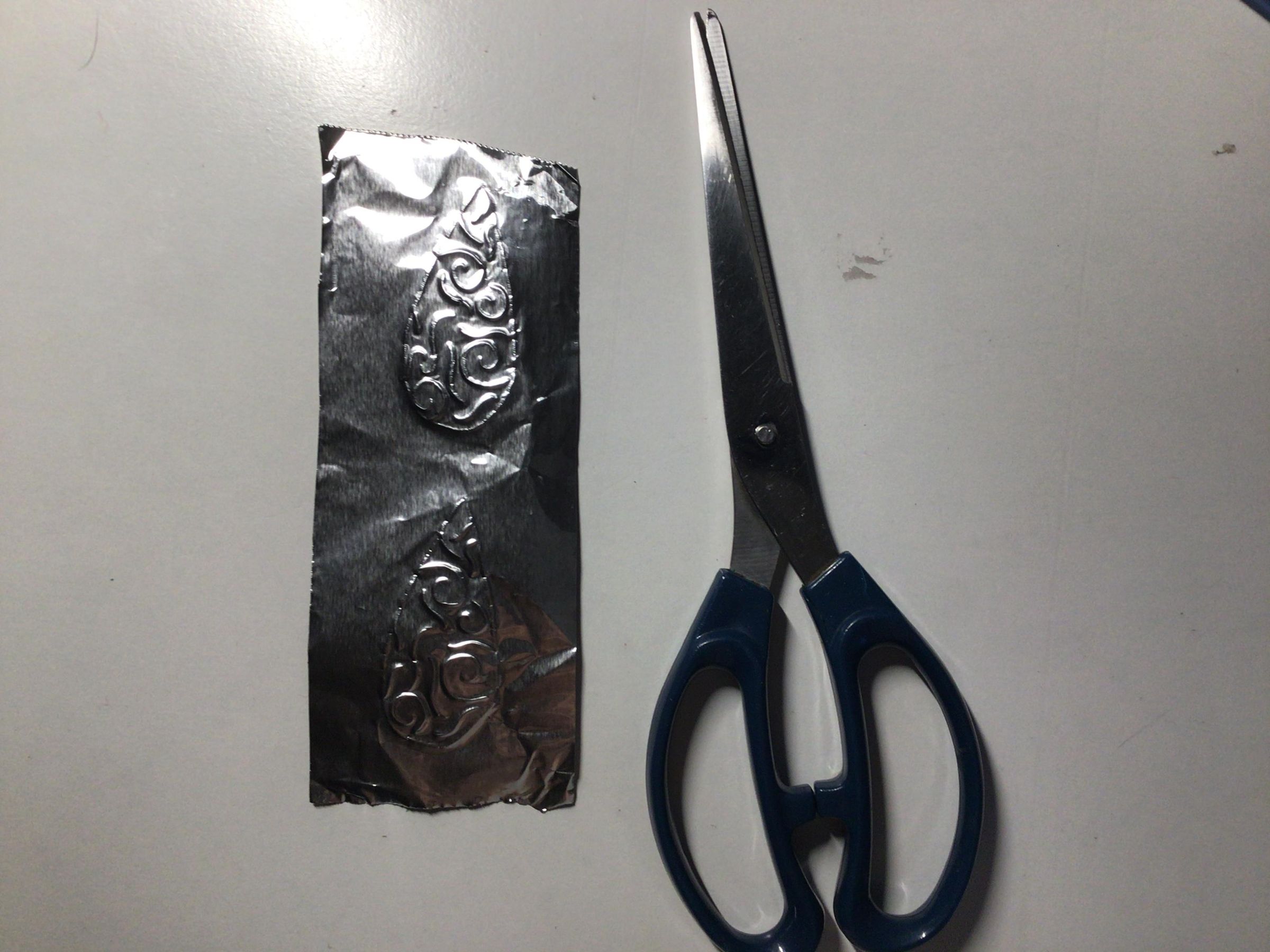 Embossed Tinfoil Earrings! : 7 Steps (with Pictures) - Instructables