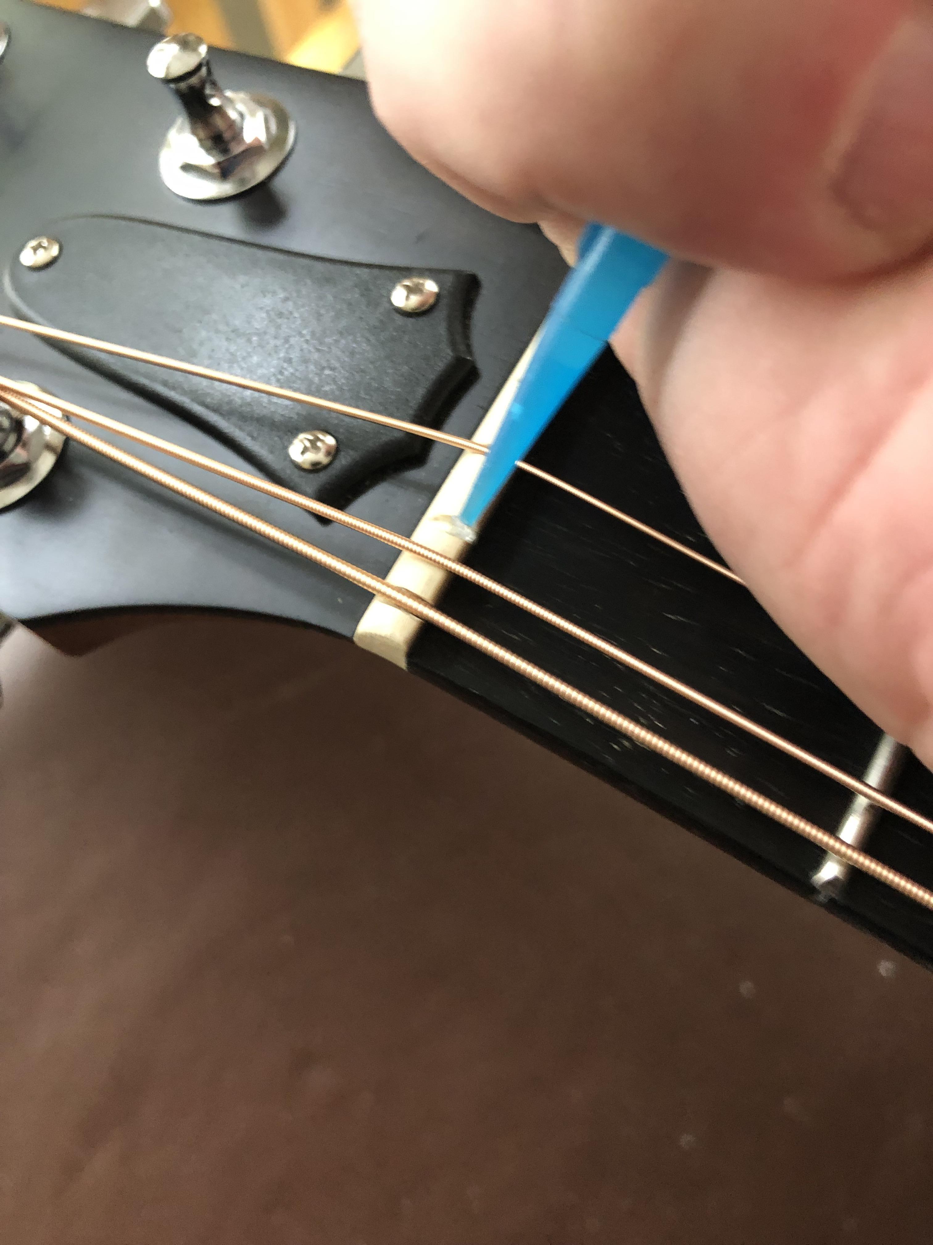 Re- Stringing a Taylor Electro Acoustic Guitar and Locking the Strings ...