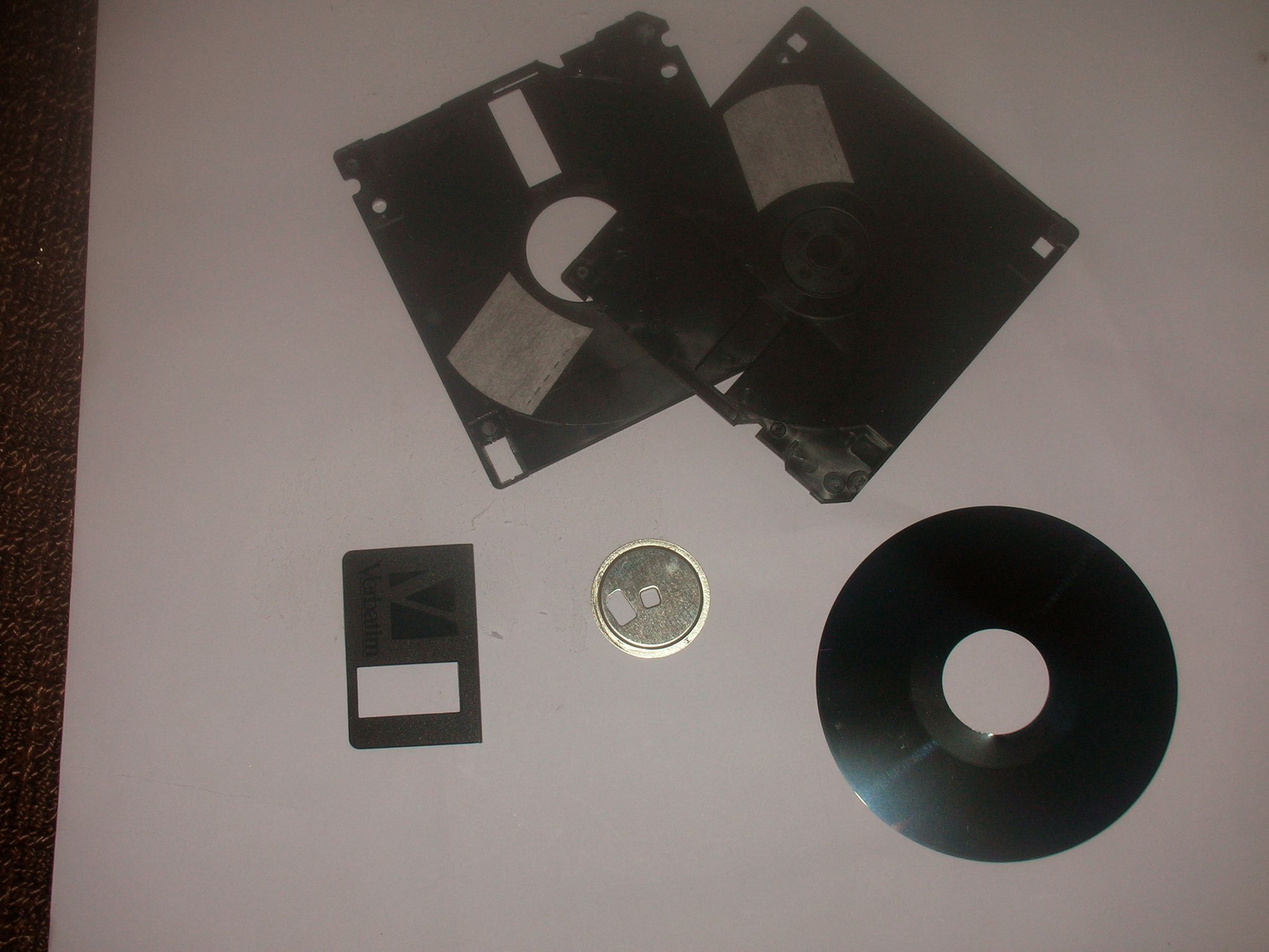 Earrings Made From Floppy Disk Parts! : 5 Steps - Instructables