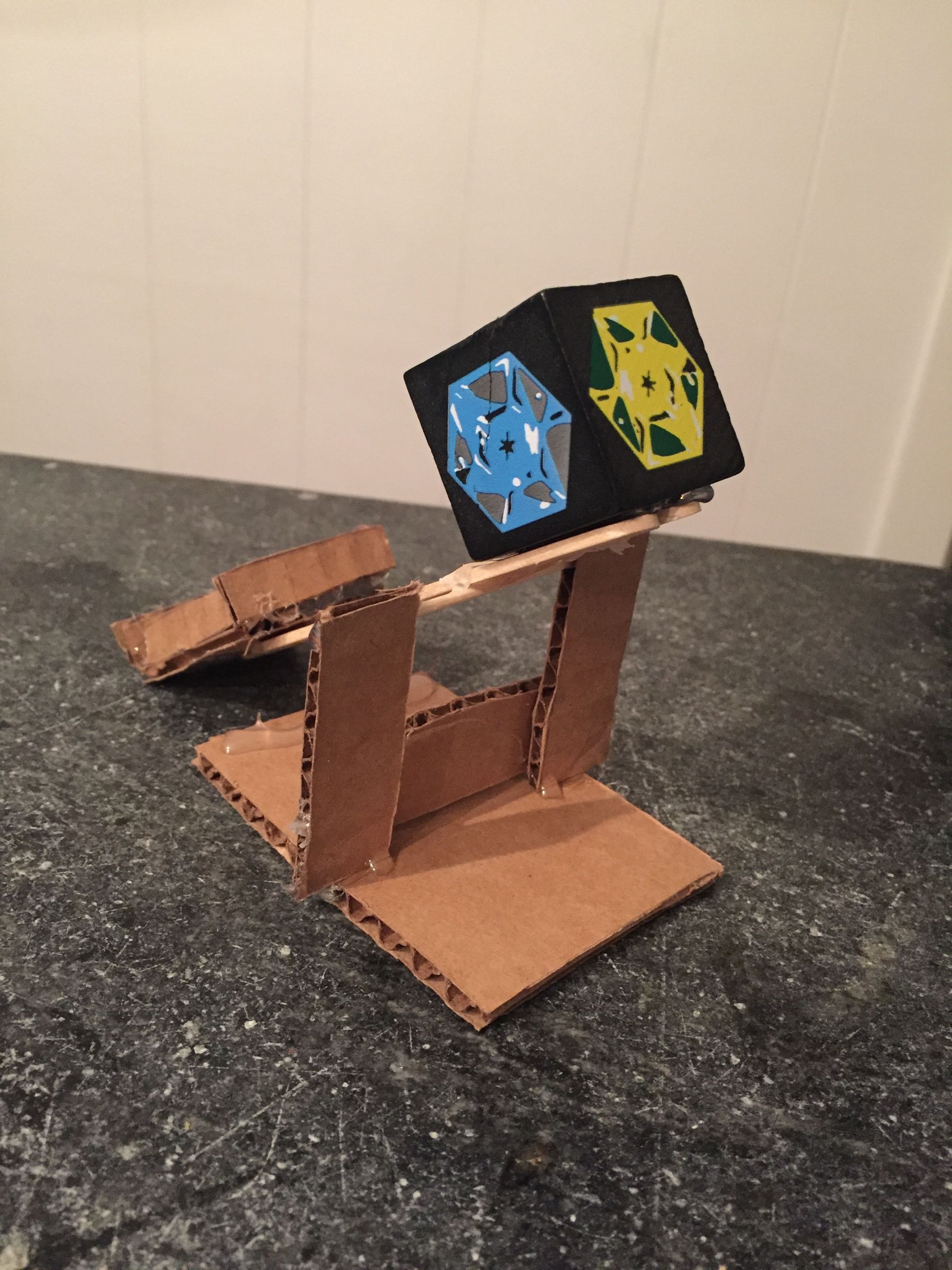 Mini Cardboard Trebuchet : 4 Steps - Instructables