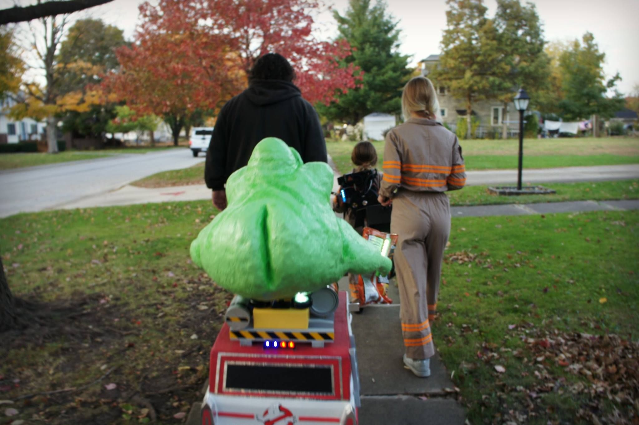 Awesome Ghostbuster With Proton Pack, Slimer, Ecto-1, and Ghost-Trap ...