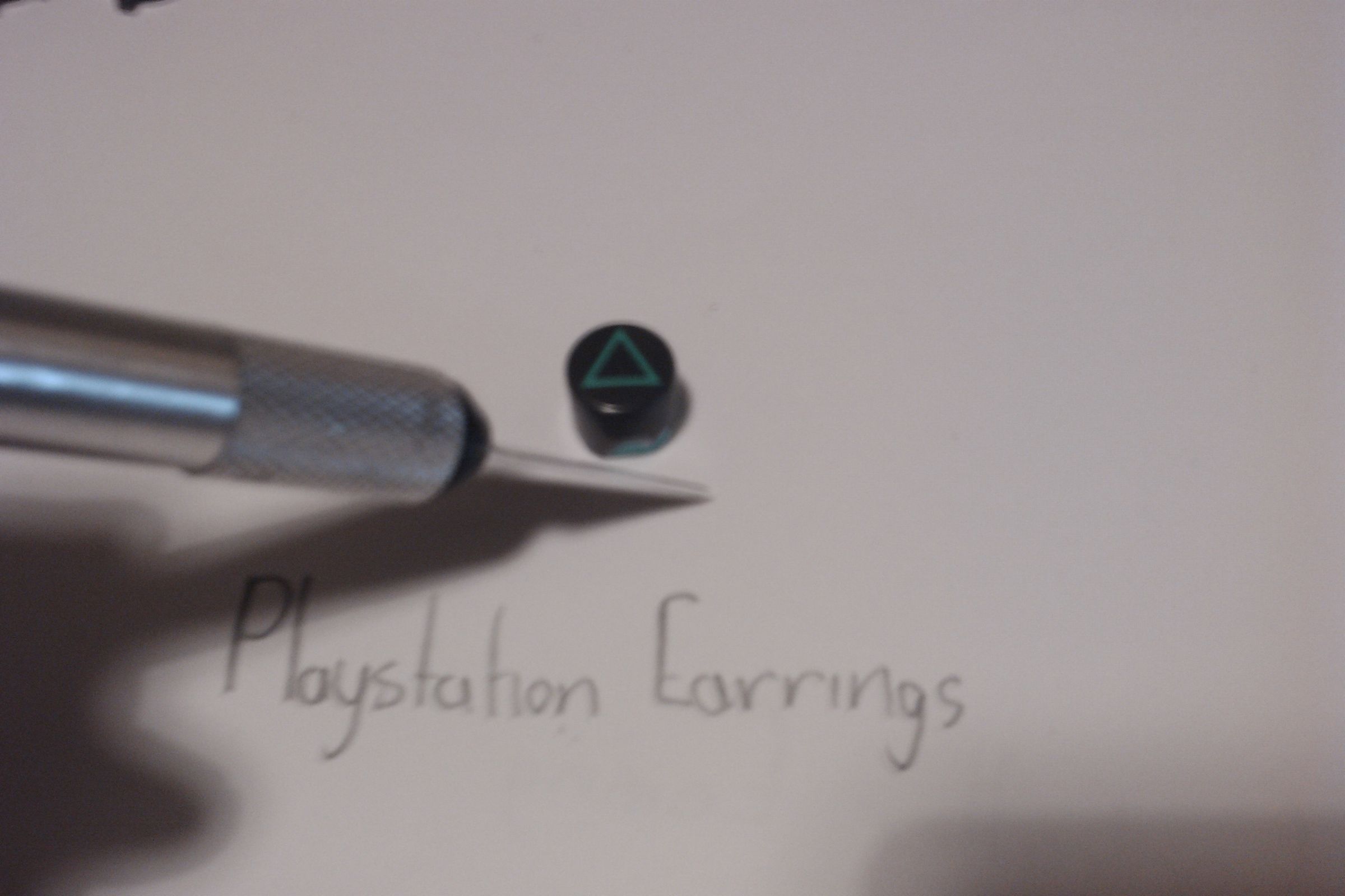 Playstation Earrings : 6 Steps - Instructables