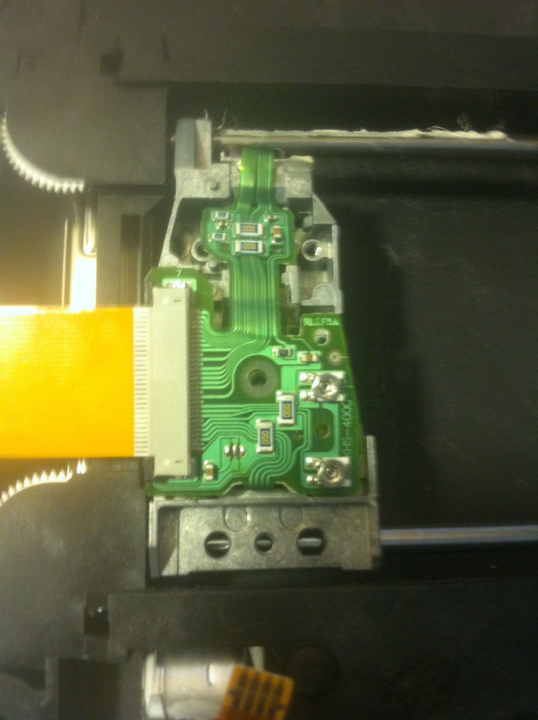 Extracting a Laser From an Old Ps2 : 4 Steps - Instructables